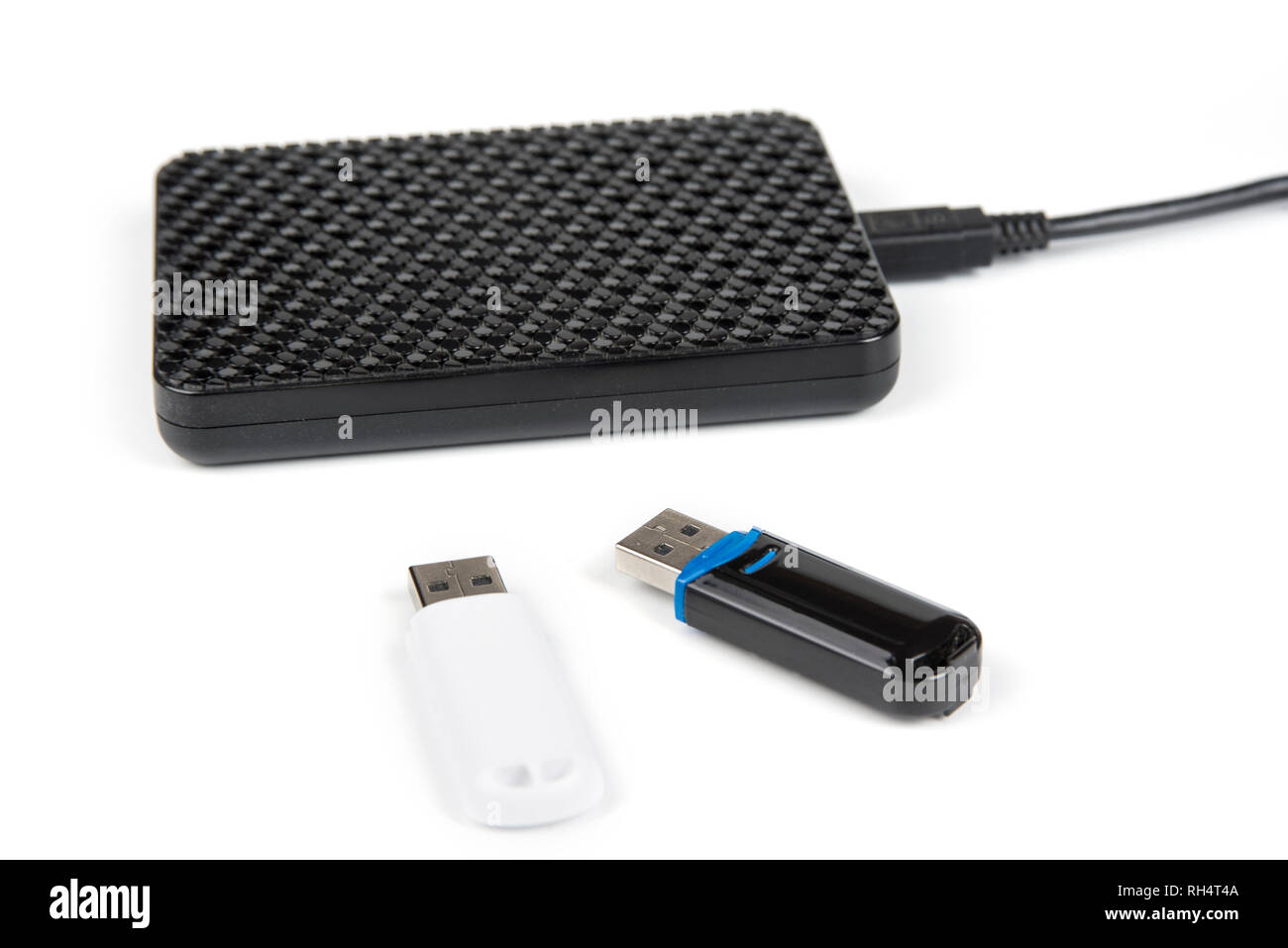 USB key and external hard disk on the white Stock Photo - Alamy