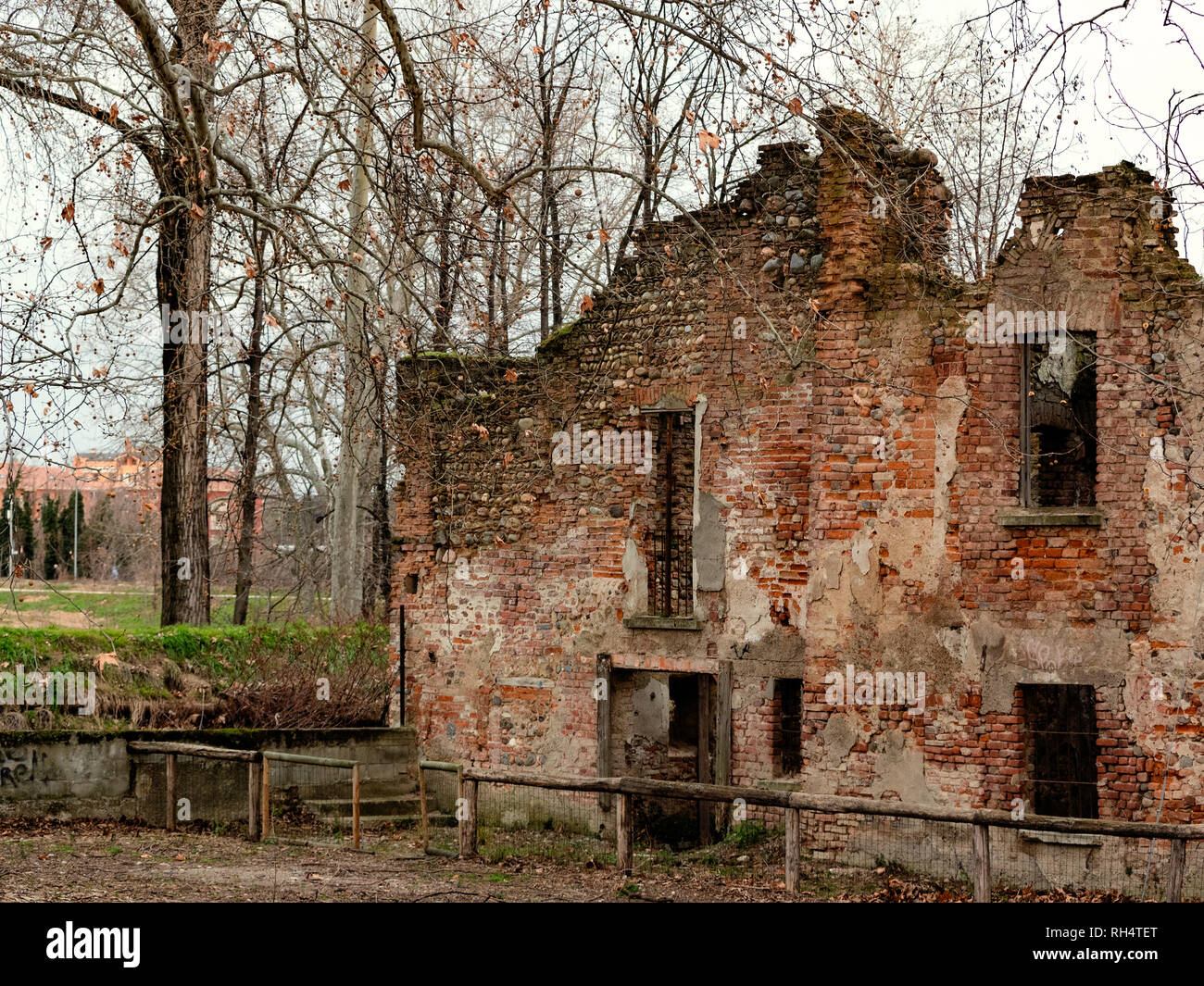 old ruined brick building on the edge of the city Stock Photo - Alamy