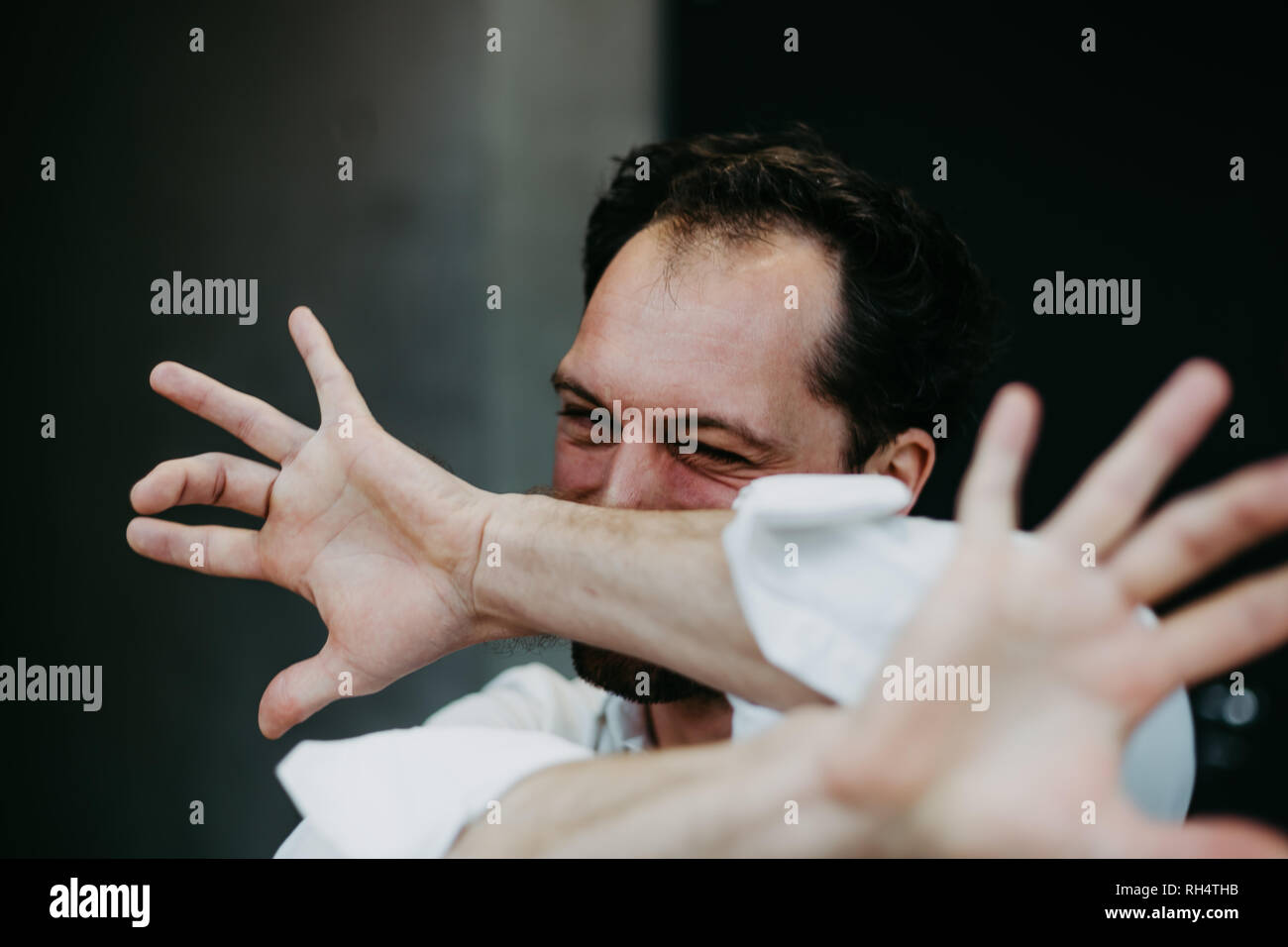 Gesture arms hi-res stock photography and images - Alamy
