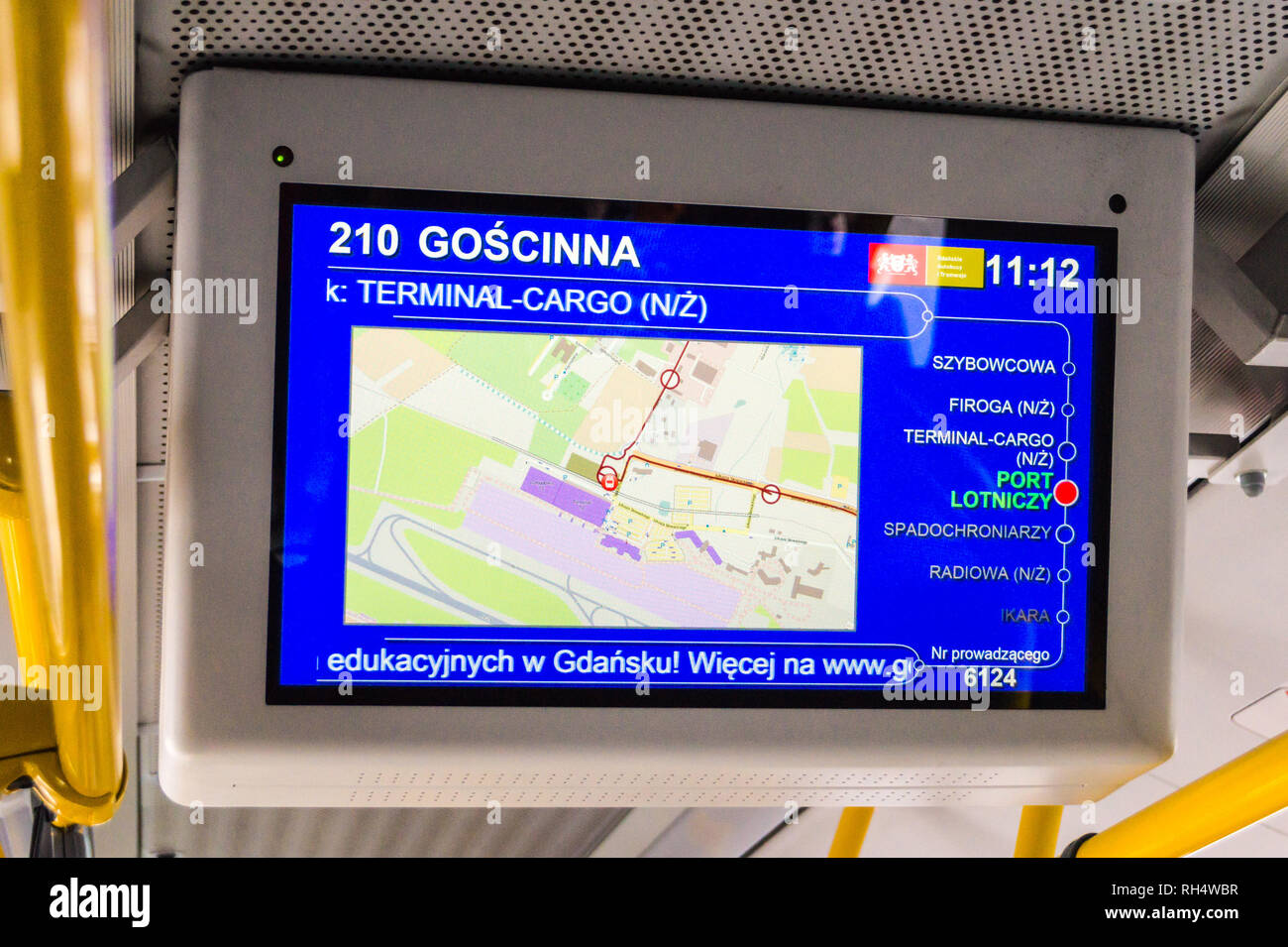 Electronic destination board and passengers on a city bus, Gdańsk ...