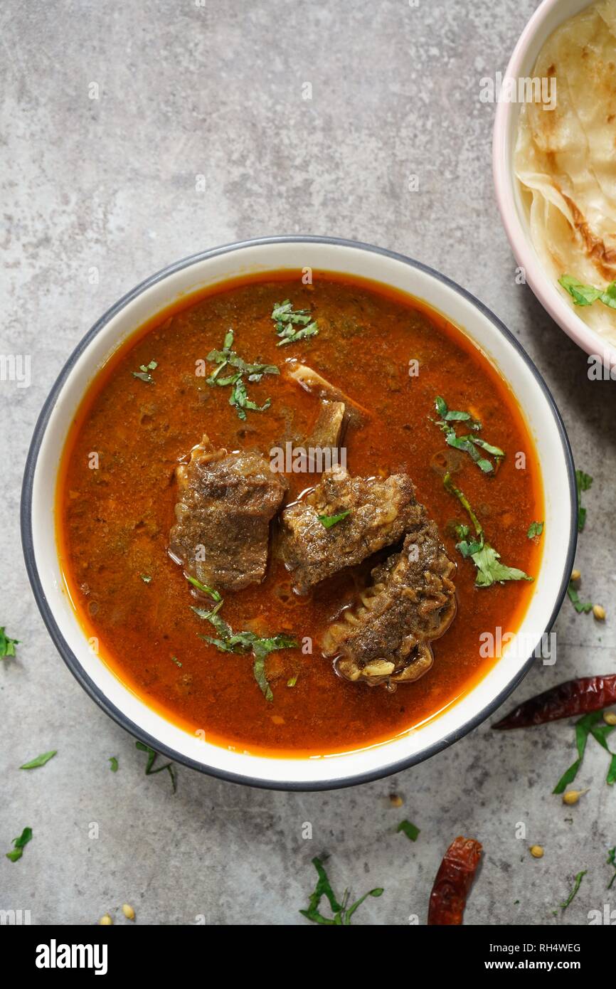 Lamb Mutton or goat curry served with Paratha, overhead view Stock ...