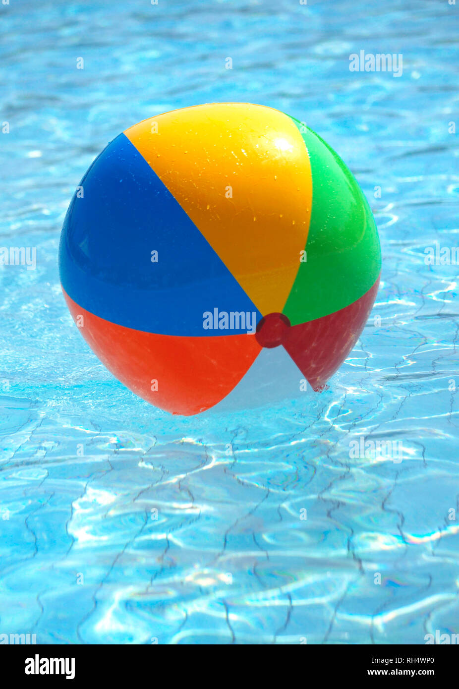 Colorfully inflated water ball floats in swimming pool Stock Photo - Alamy