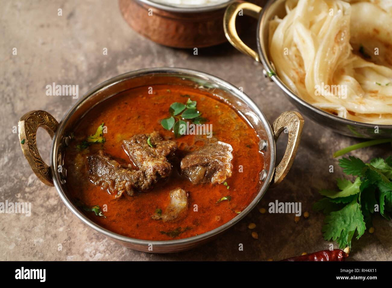 Goat or Lamb Mutton curry with rice nd roti/ Indian meal concept Stock ...