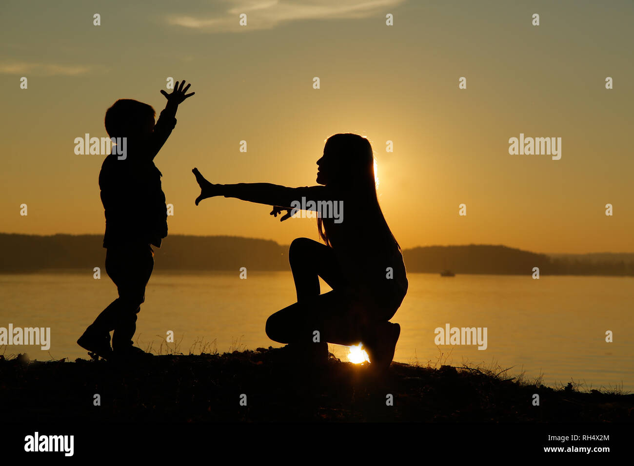 Sister And Brother Sunset High Resolution Stock Photography and Images ...