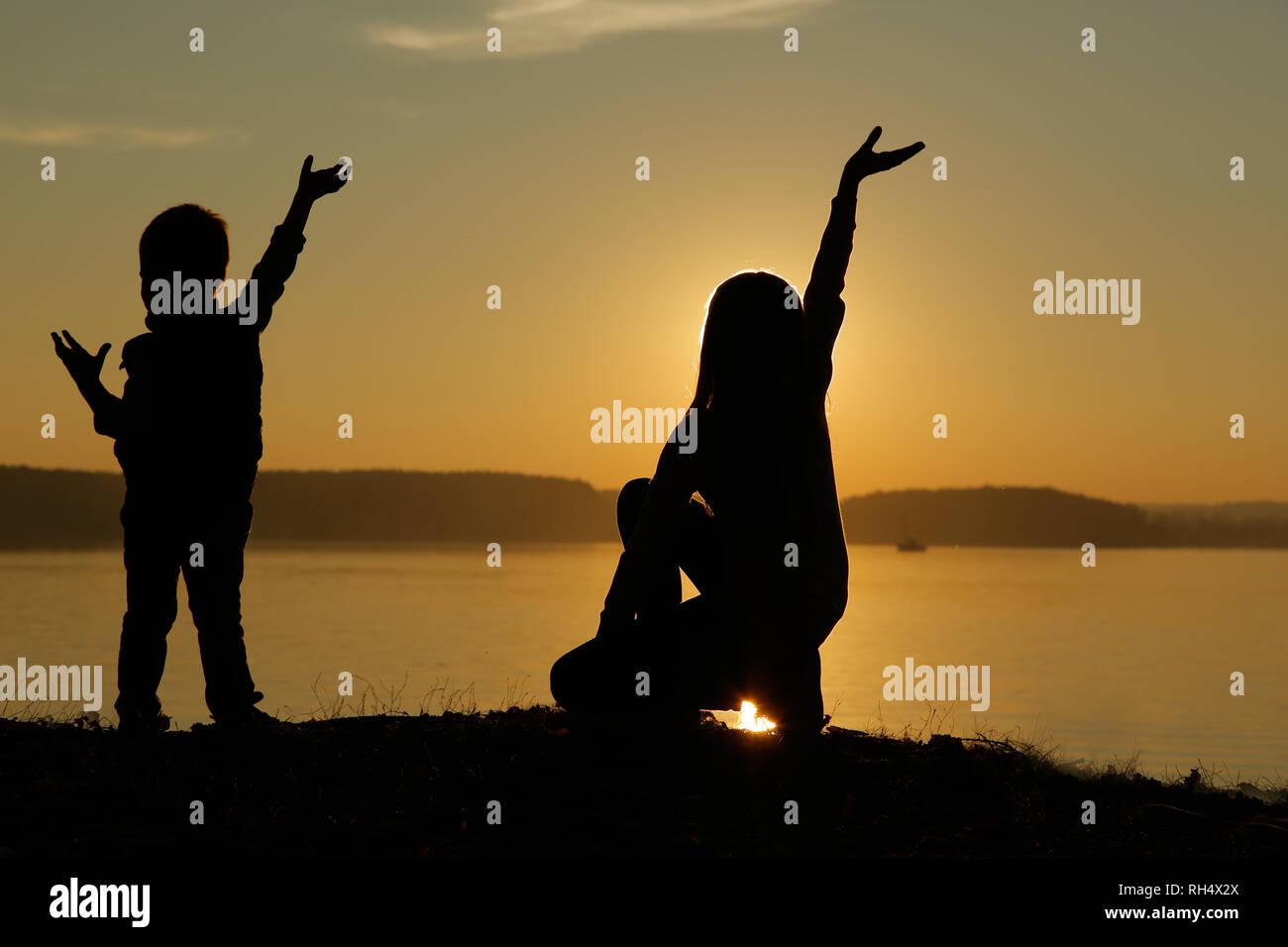 Brother And Sister Silhouette High Resolution Stock Photography and ...