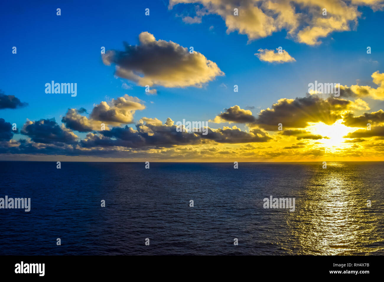 Magnificent summertime sunset over the Caribbean Sea. Amazing colors in ...
