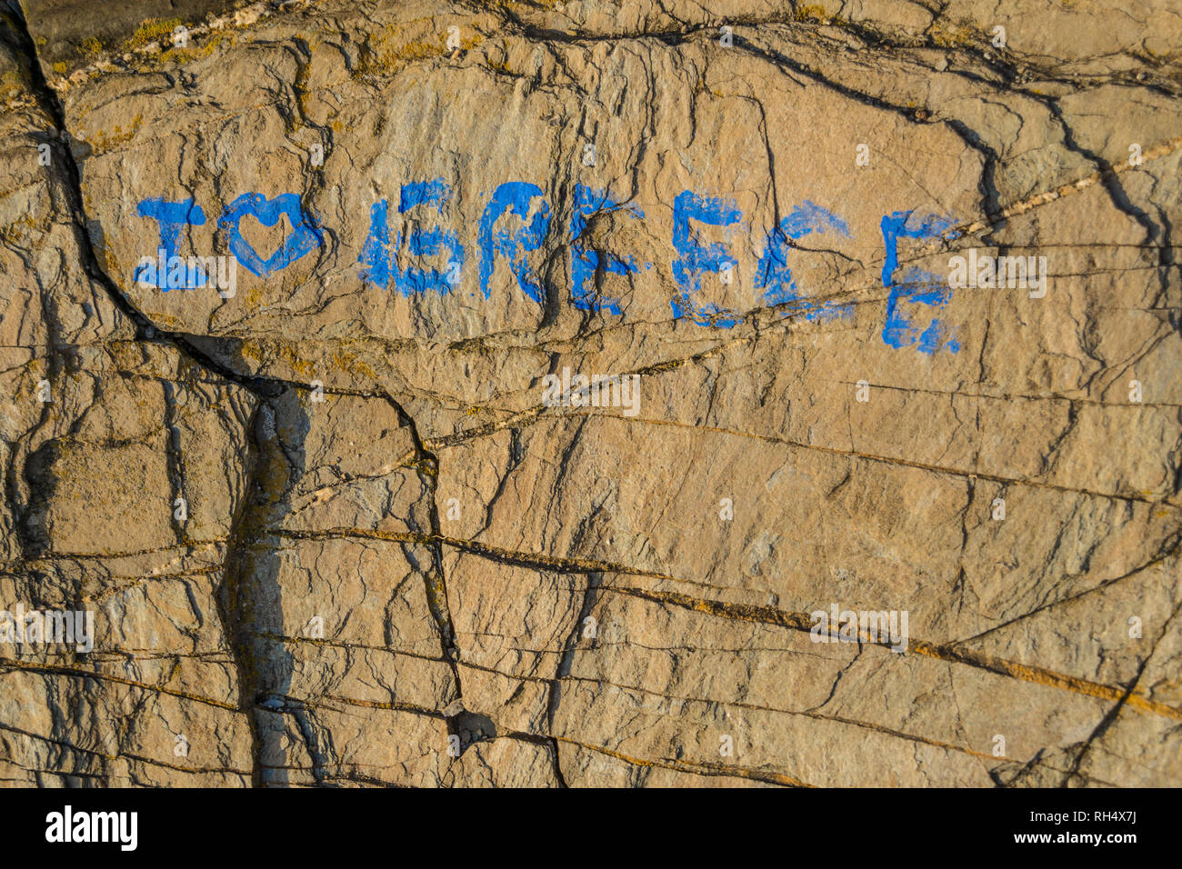 I love Greece blue inscription on the stone on the beach Stock Photo ...