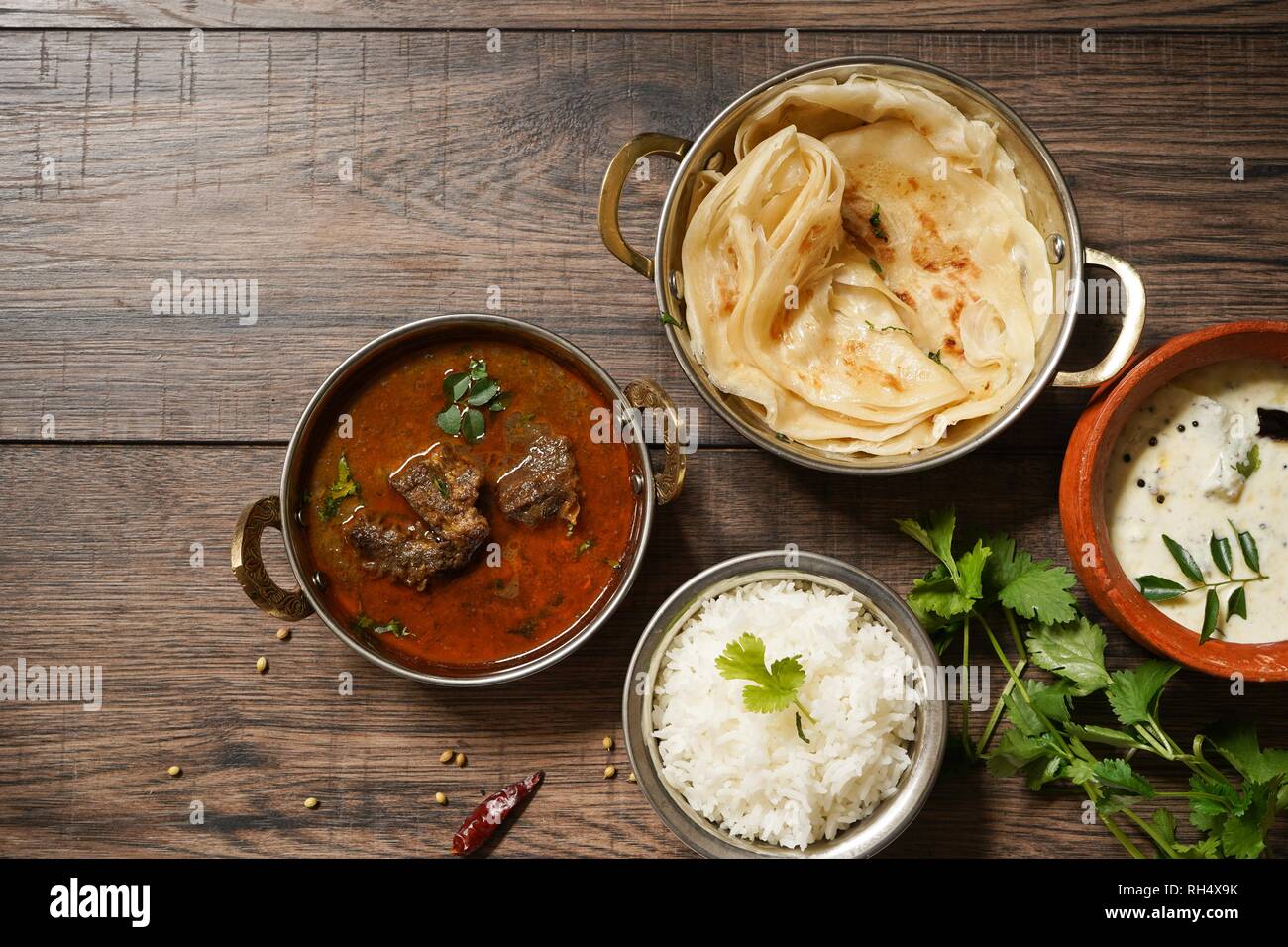 Goat or Lamb Mutton curry with rice nd roti/ Indian meal concept Stock ...