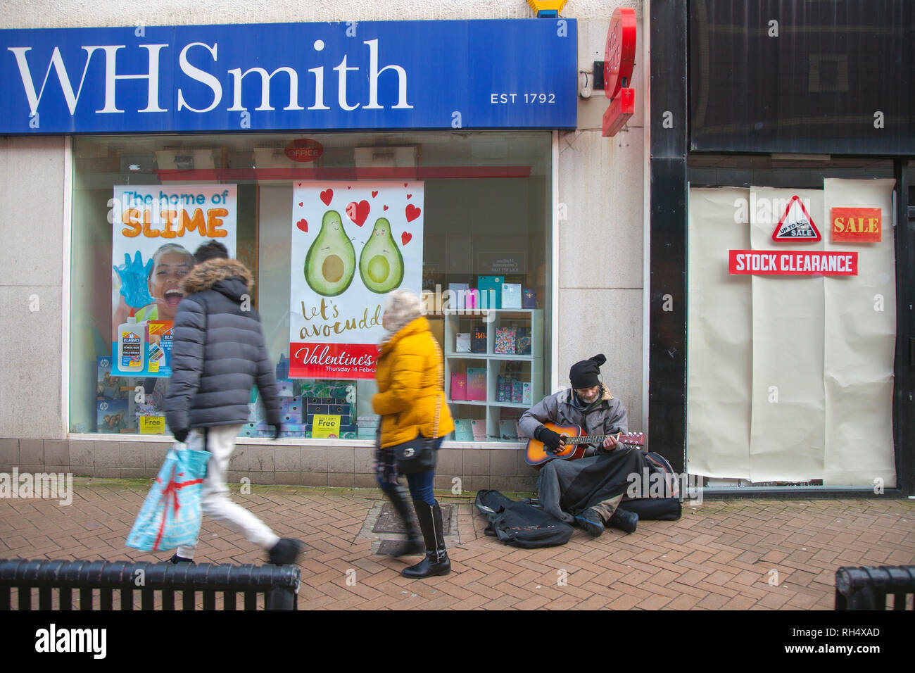 Homeless street Busker with guitar, playing music, musician, street ...