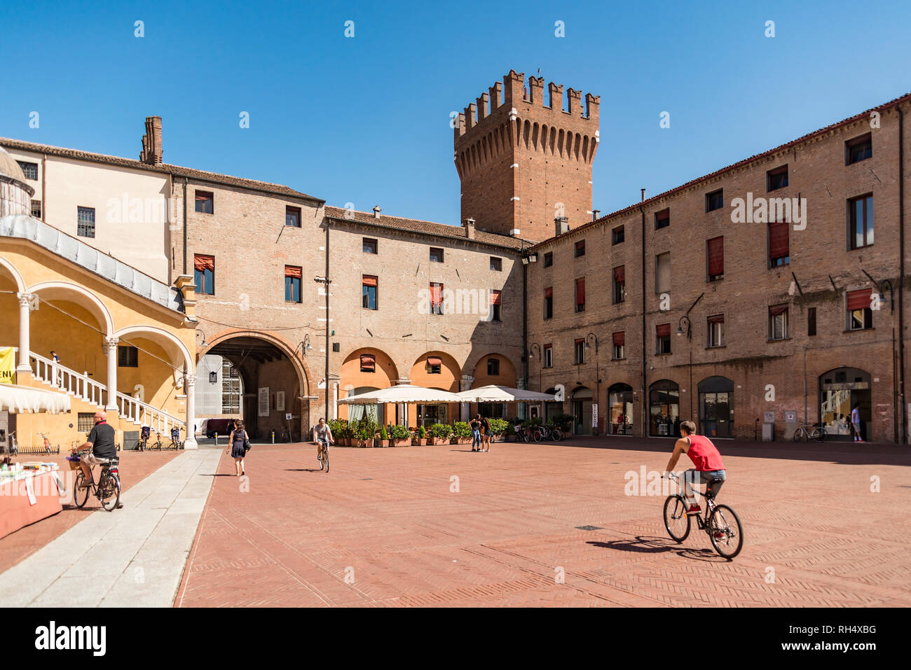 FERRARA, ITALY - JUNE 29. 2017: People walk and ride bikes in the heart ...