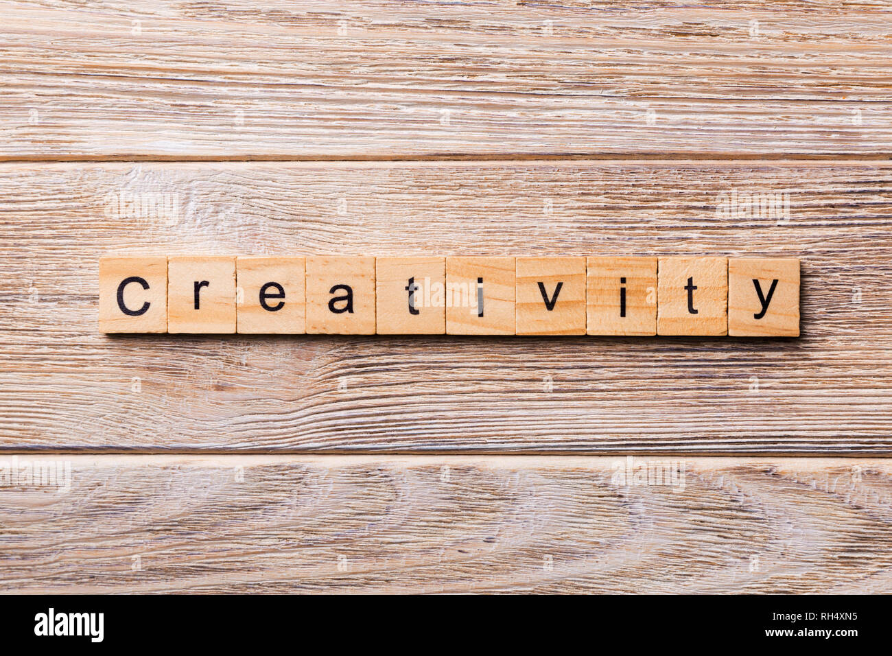 creativity word written on wood block. creativity text on wooden table ...