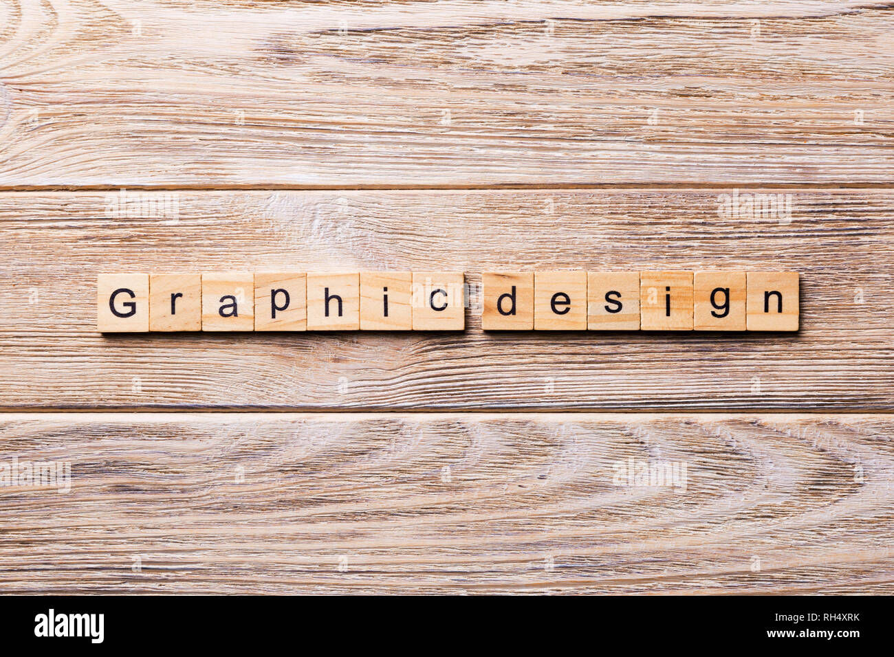 graphic design word written on wood block. graphic design text on ...