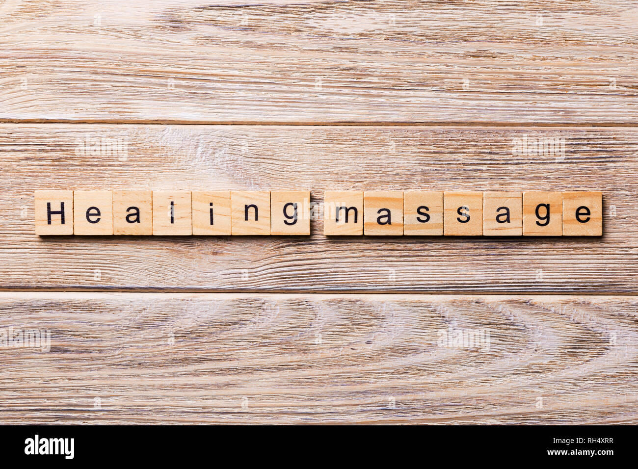 healing massage word written on wood block. healing massage text on ...