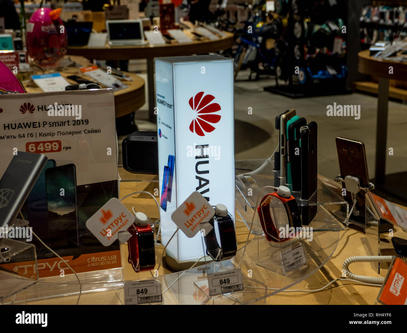 Huawei logo seen at the shelf with smartphones in the store Stock Photo ...