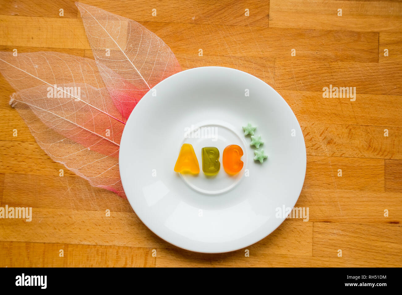 Jelly bean sweets and ABC letters. Education and alphabet concept Stock ...