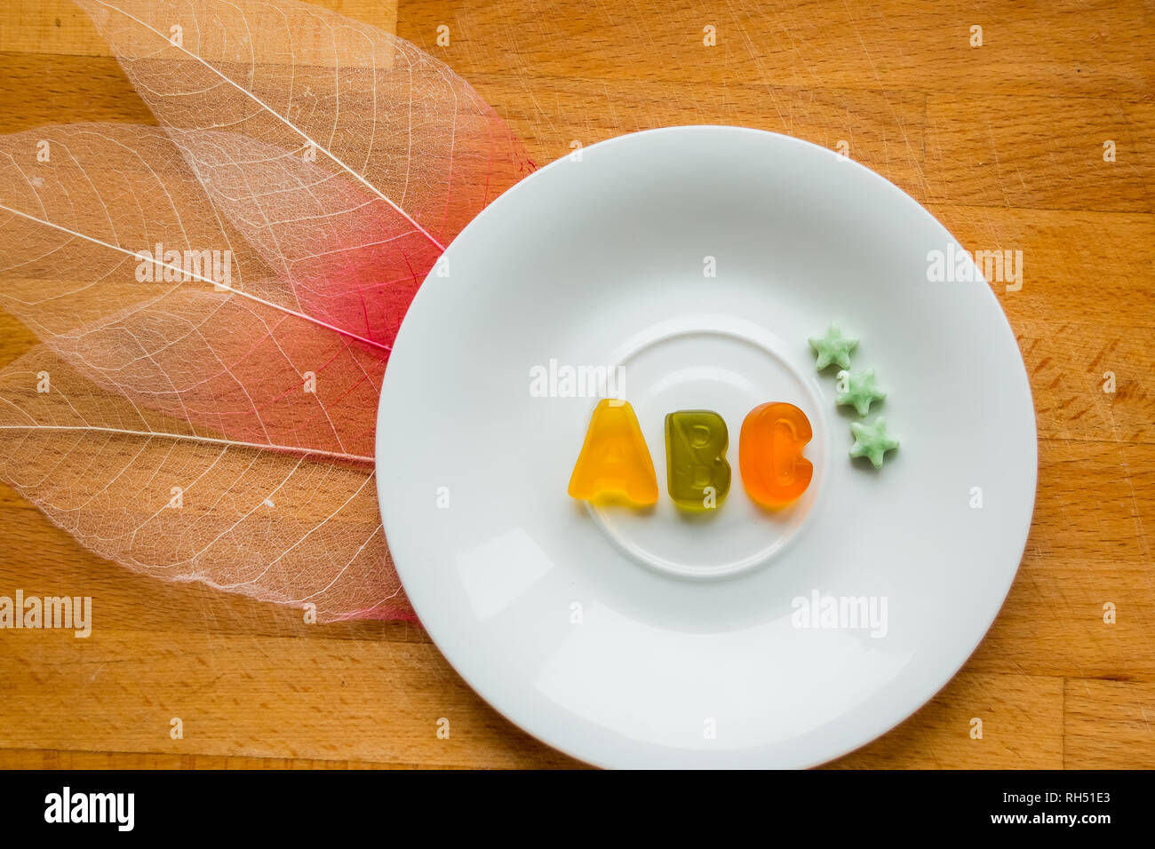 Jelly bean sweets and ABC letters. Education and alphabet concept Stock ...