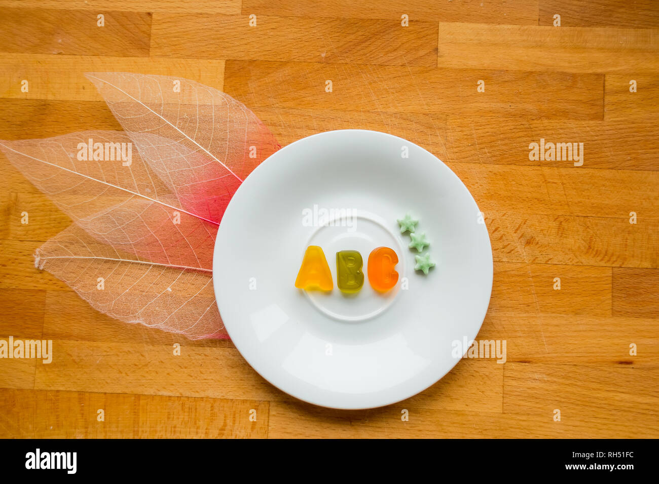 Jelly bean sweets and ABC letters. Education and alphabet concept Stock ...