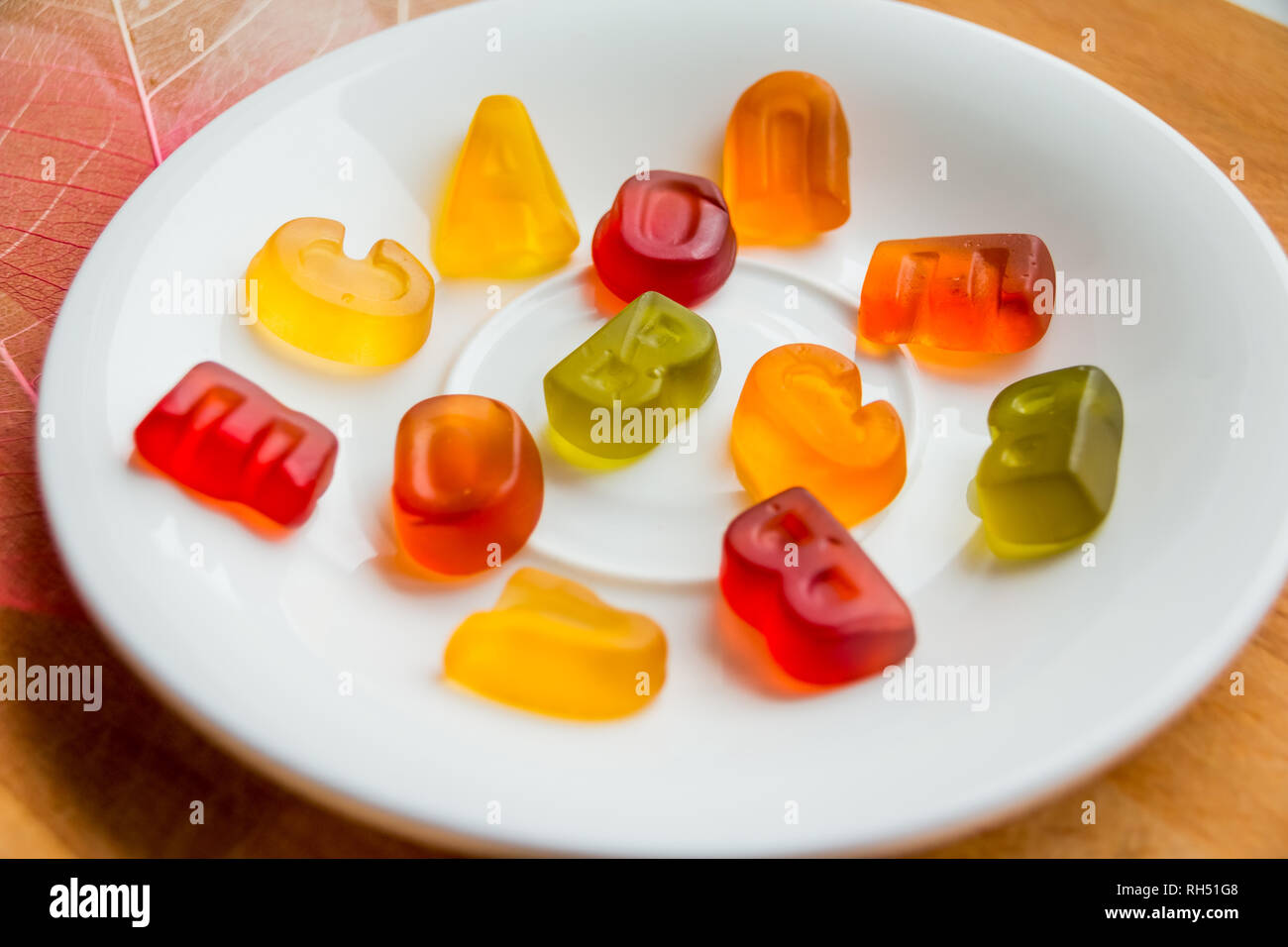 Jelly bean sweets and ABC letters. Education and alphabet concept Stock ...