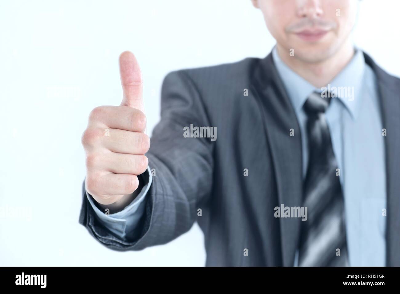closeup.young business men showing thumb up. photo with copy space ...