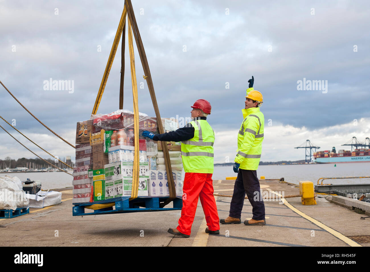 Ship receiving its crew's food and grocery supplies on Harwich quay ...