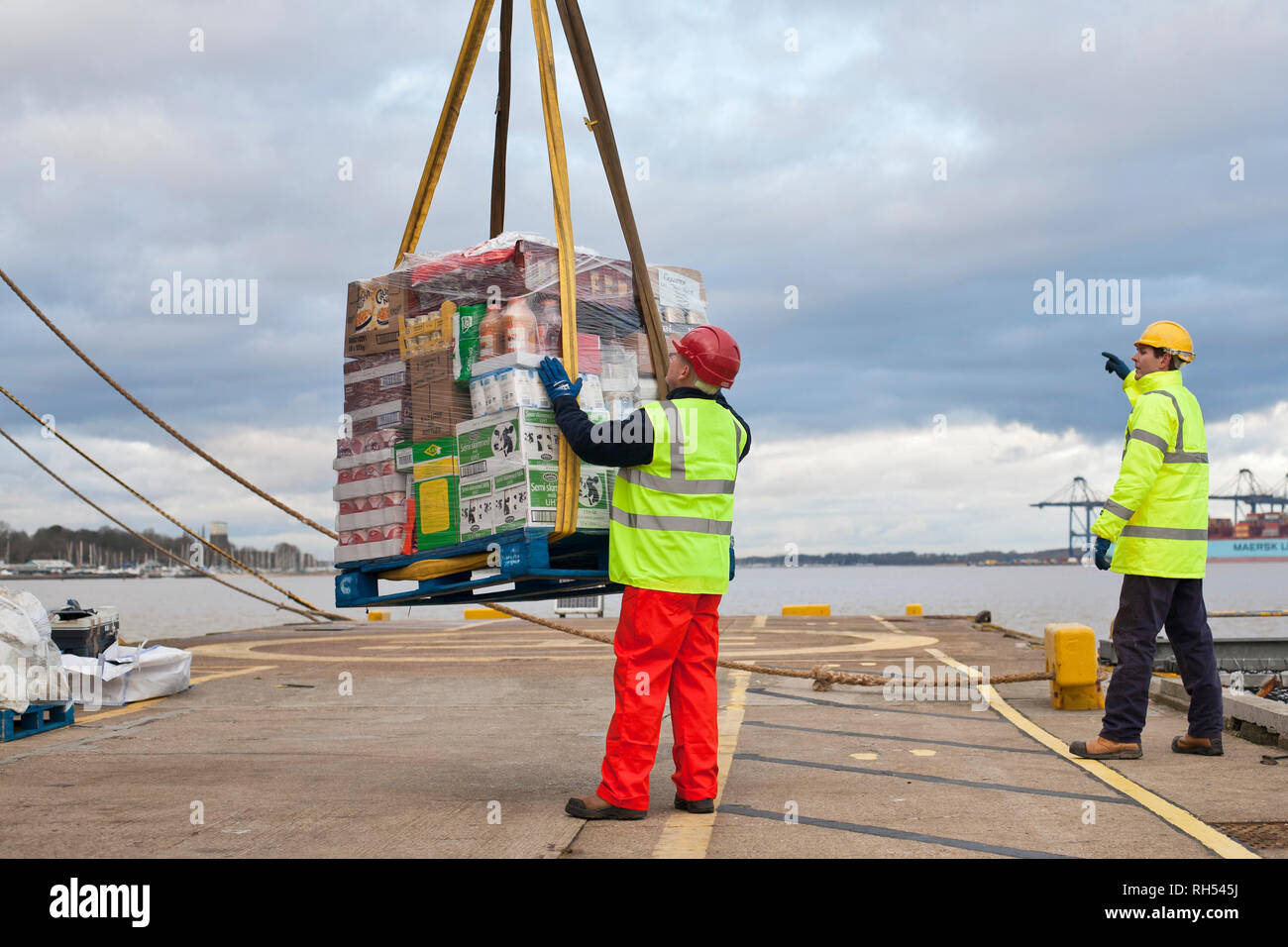 Ship receiving its crew's food and grocery supplies on Harwich quay ...