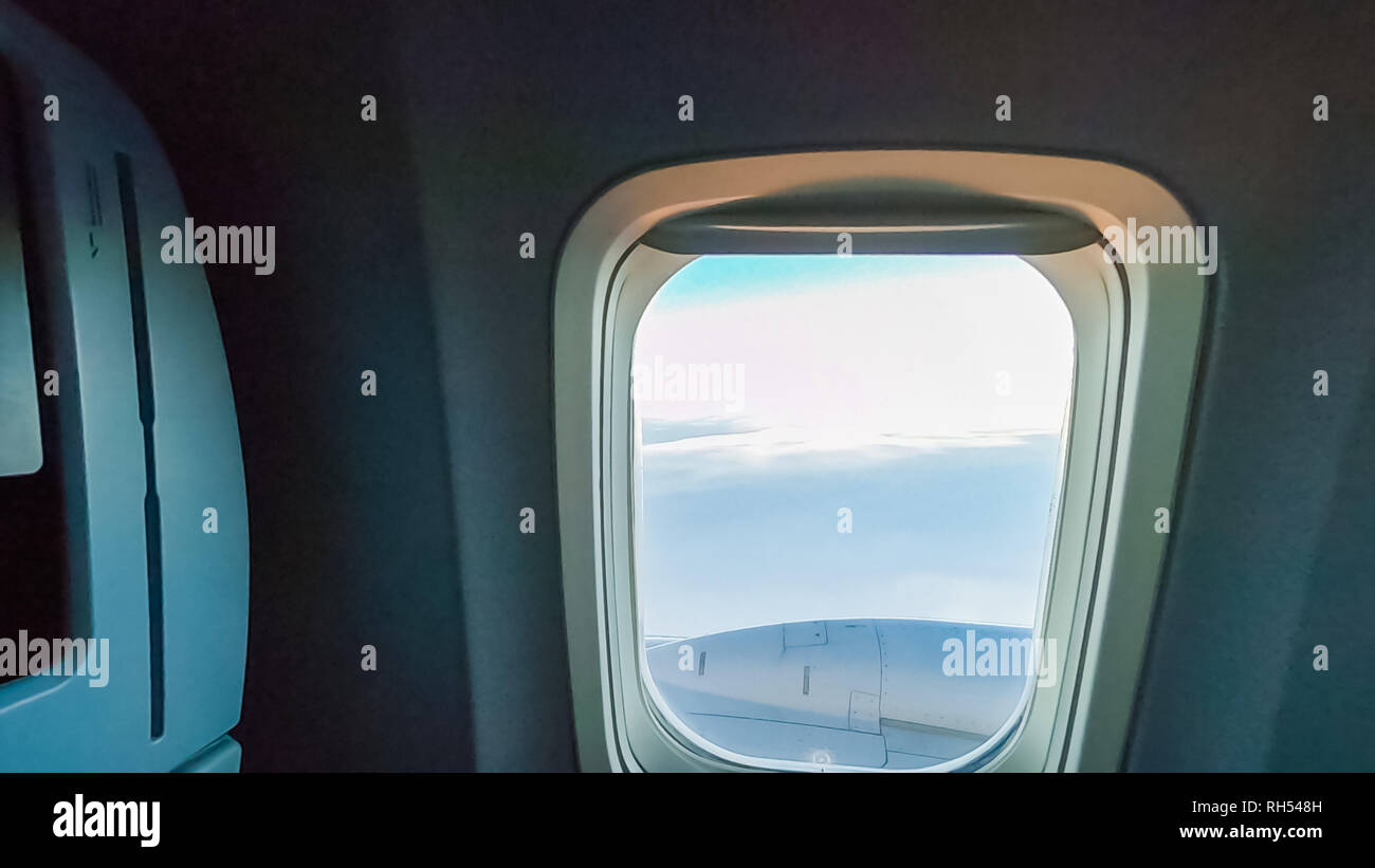 View from the window seat of commercial passenger airplane Stock Photo ...