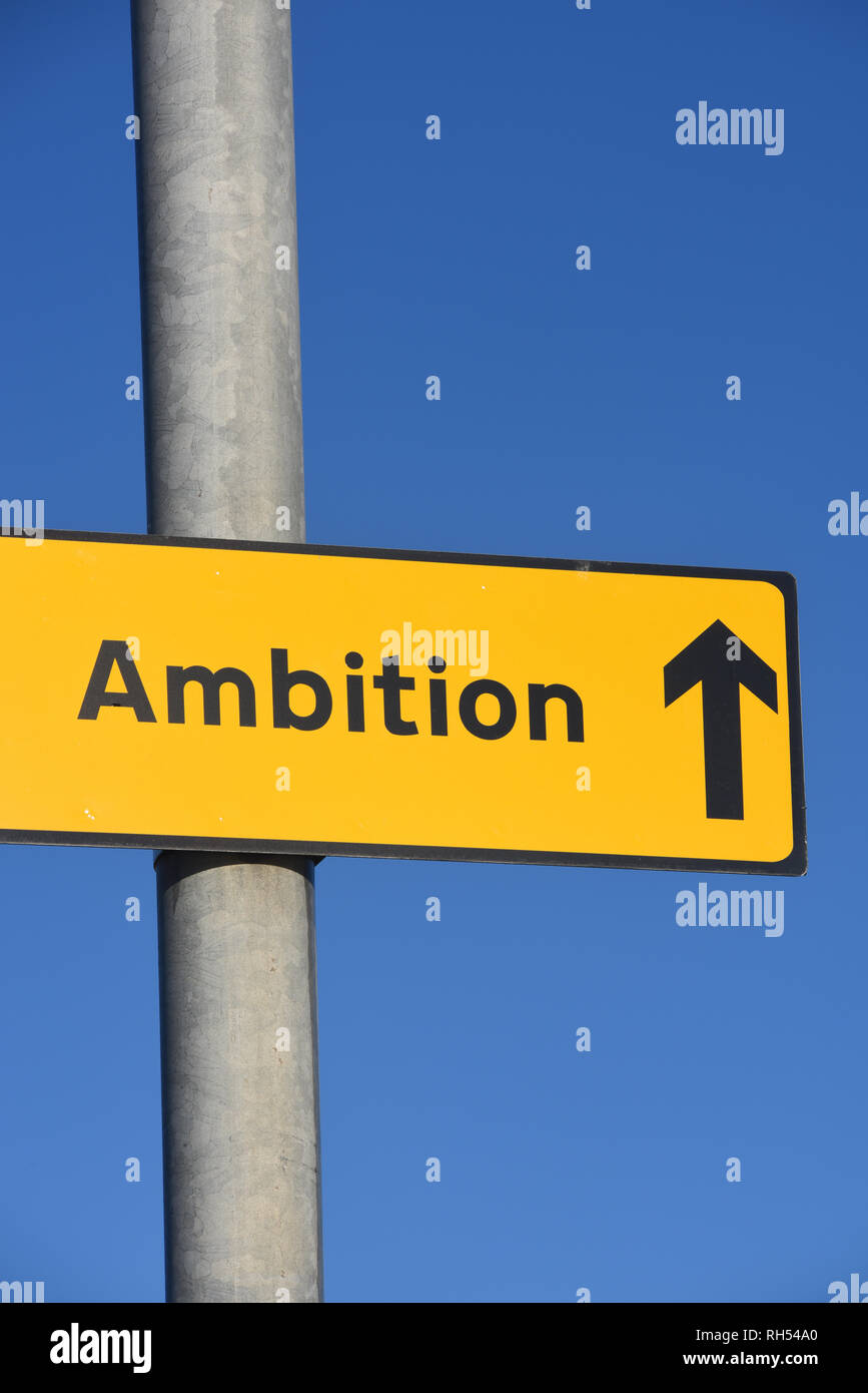 roadside roadsign arrow pointing to ambition project Stock Photo - Alamy