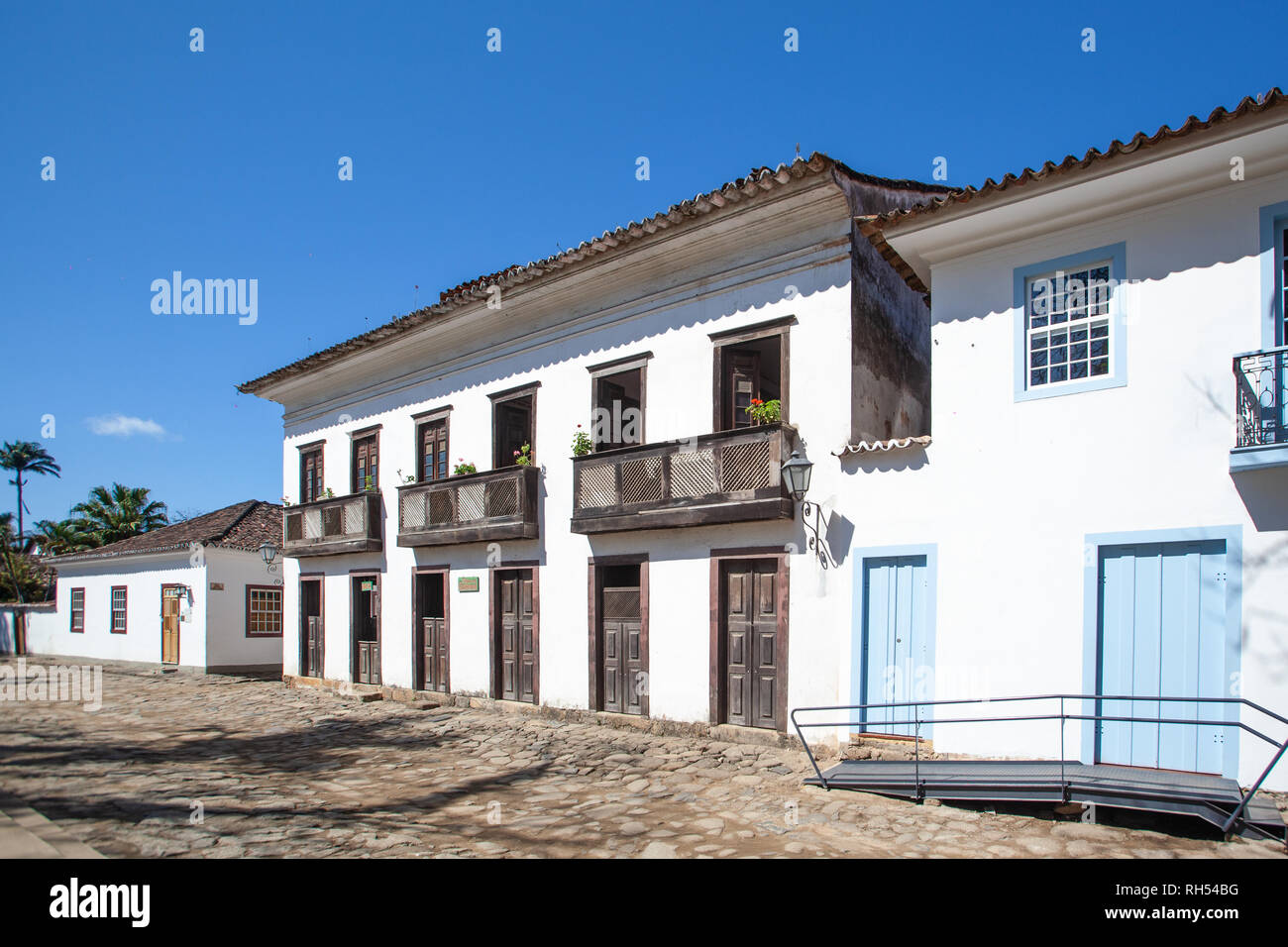 Street and old portuguese colonial houses in historic downtown in ...