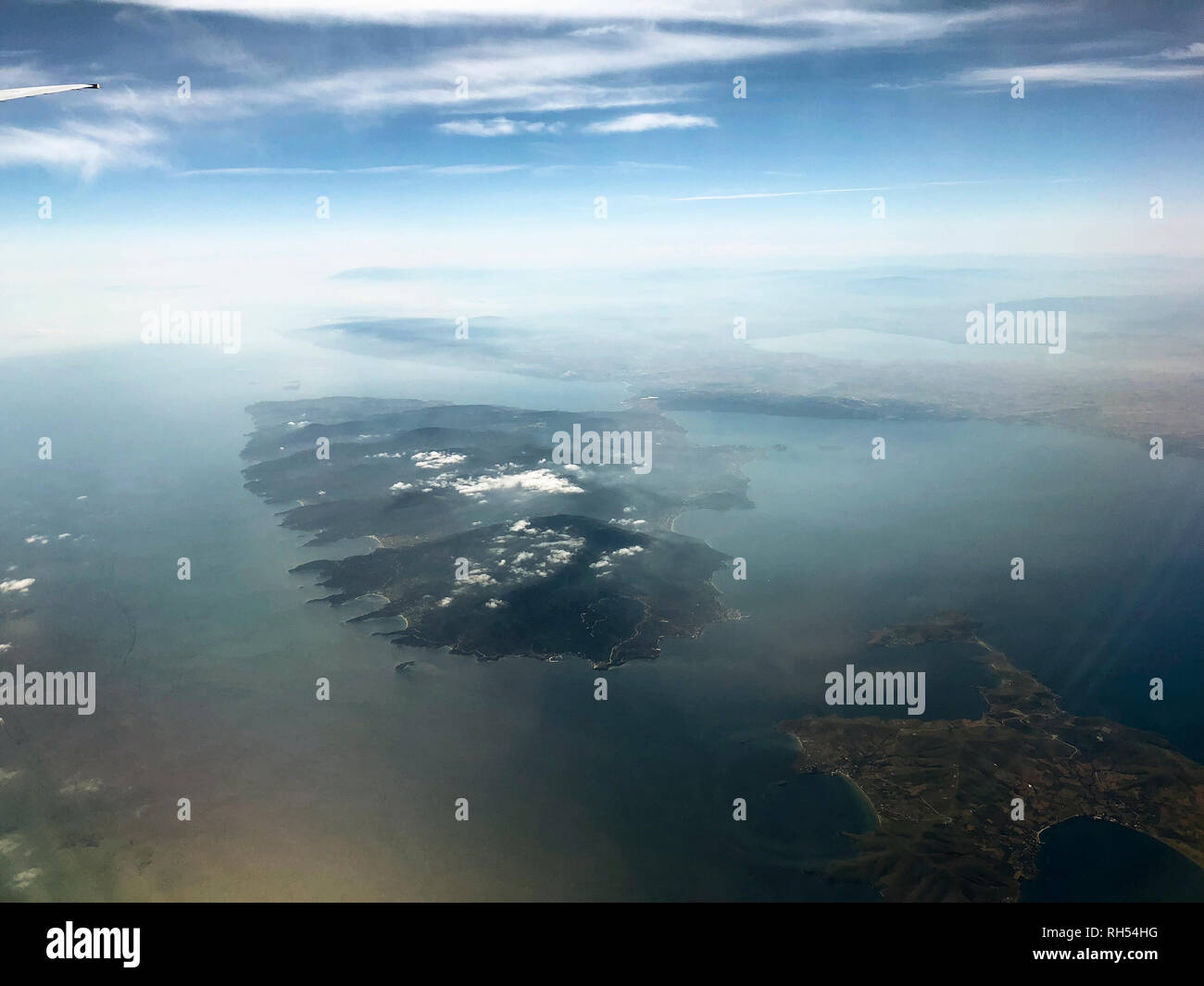 Landscape view from a window of a plane while in flight over Izmir city ...
