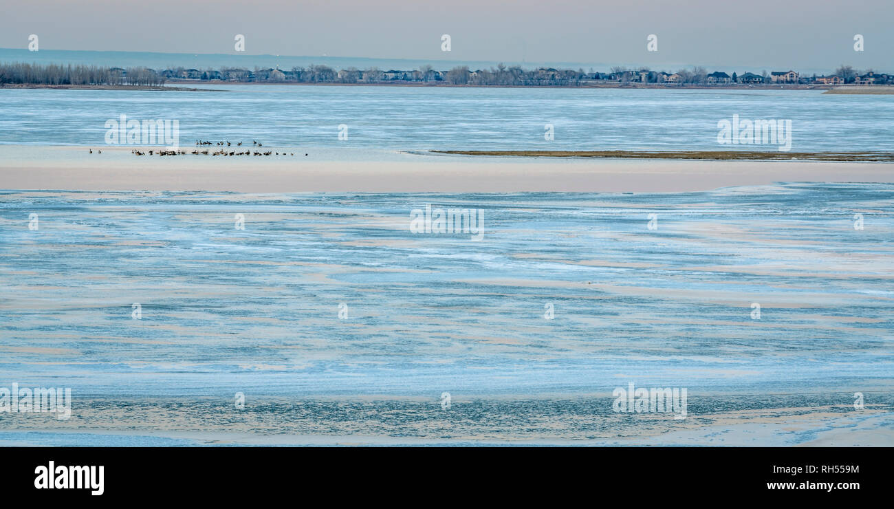 WInter dusk over frozen Boyd Lake in northern Colorado Stock Photo - Alamy