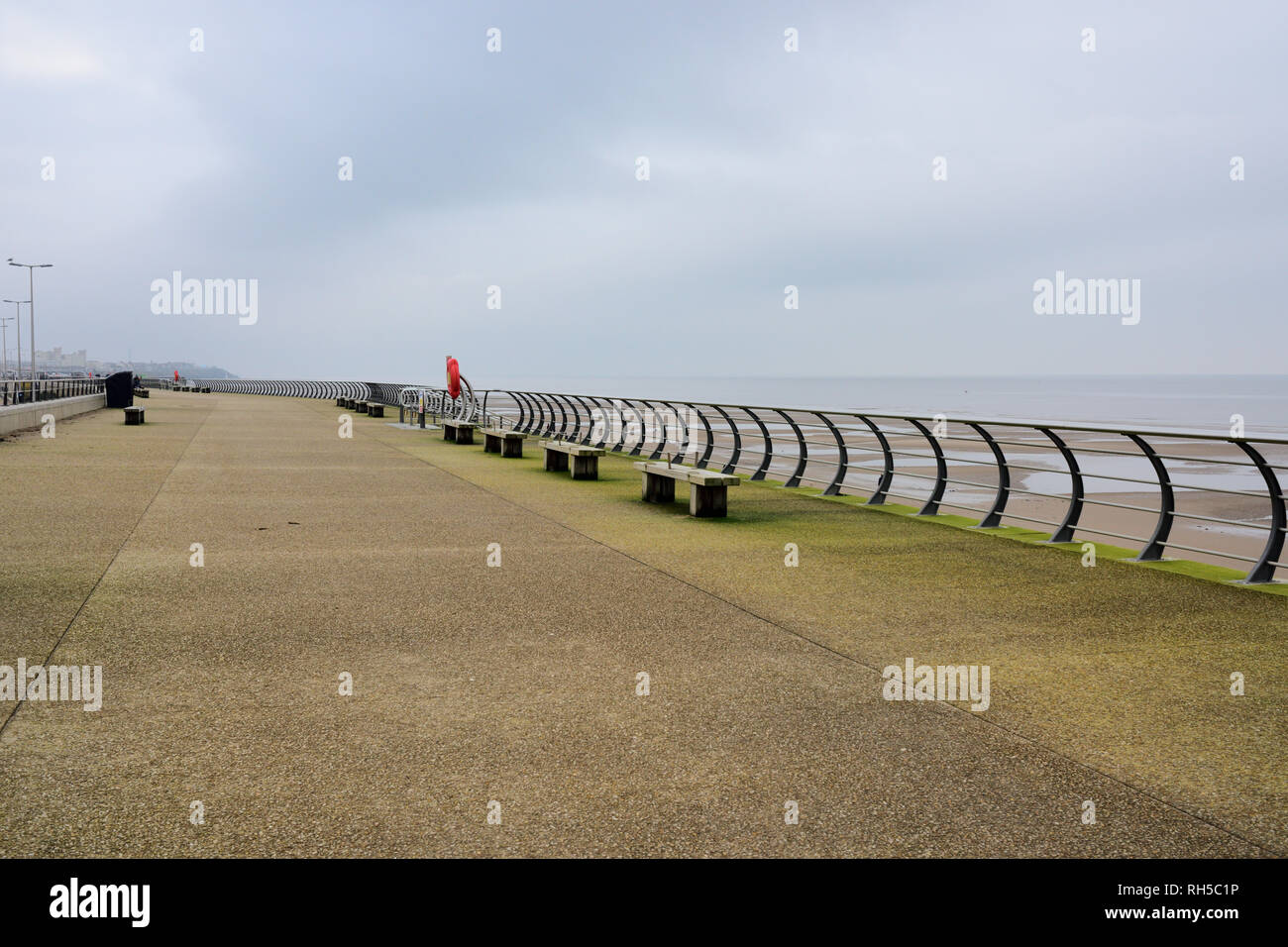 Stainless steel seafront balustrade edge protection bolted to concrete ...