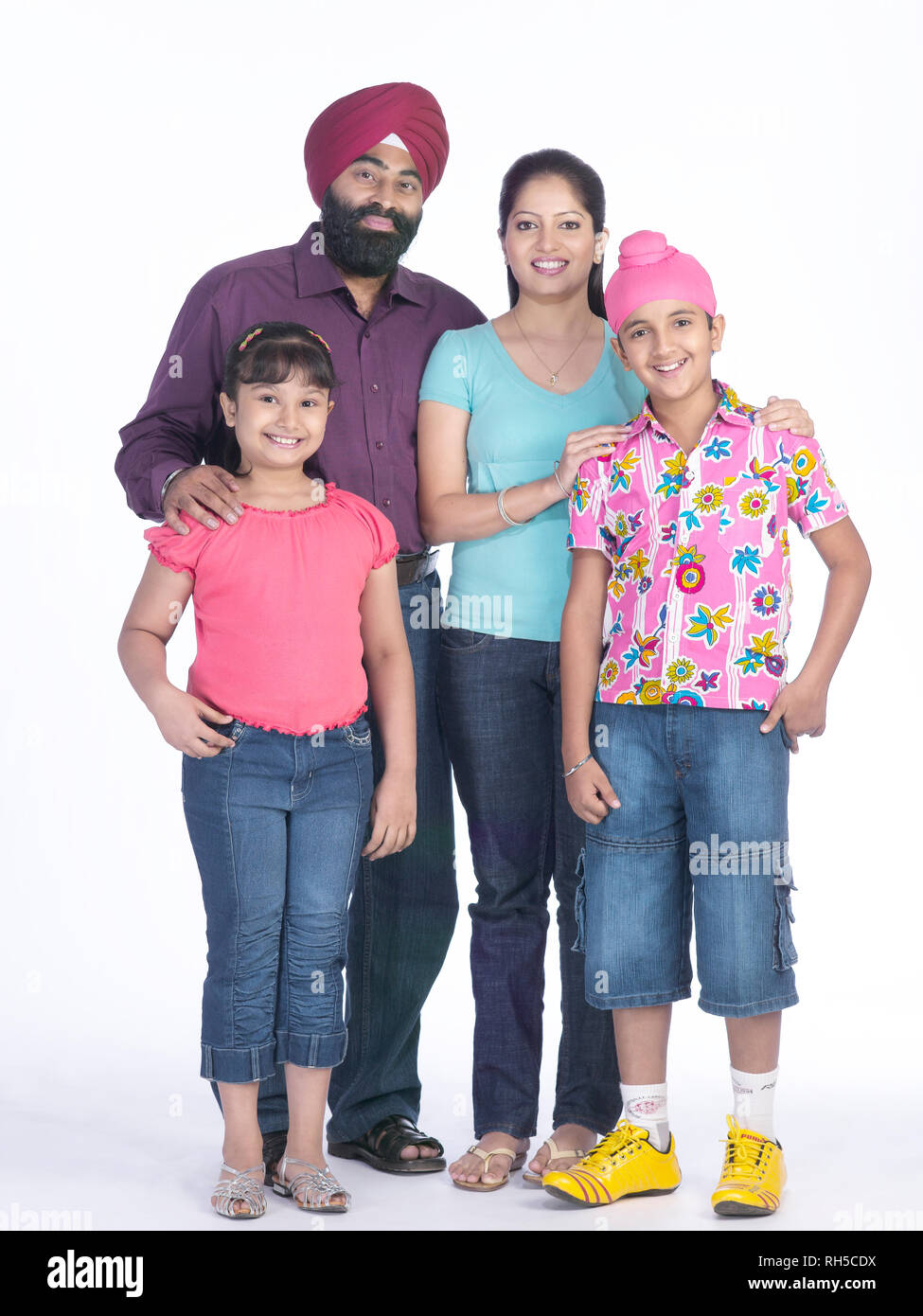 PORTRAIT OF A SIKH SARDAR FAMILY OF FOUR Stock Photo - Alamy
