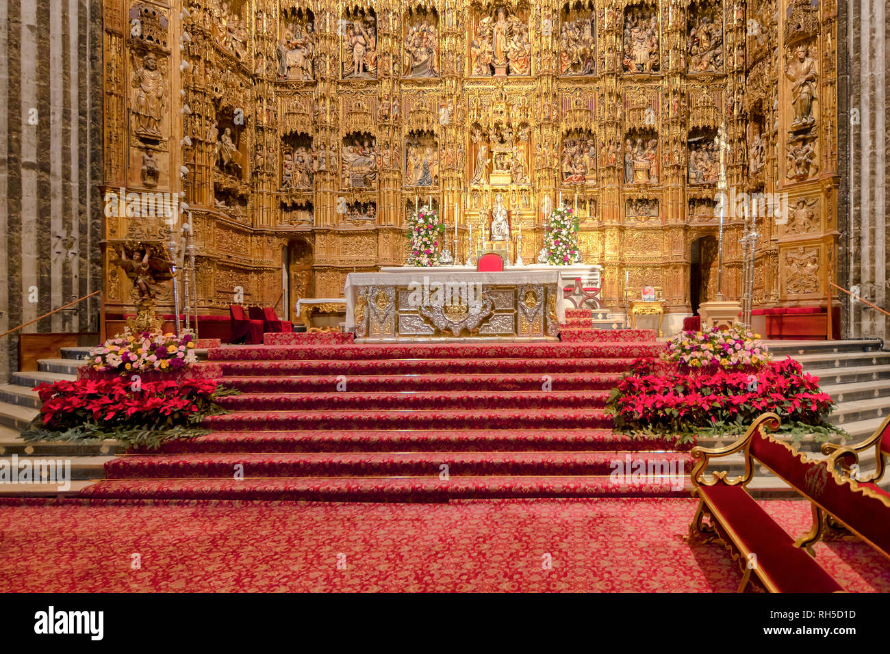 Seville, Spain - January 13, 2019: View of the main altar "Altar Mayor" in the Seville cathedral ...