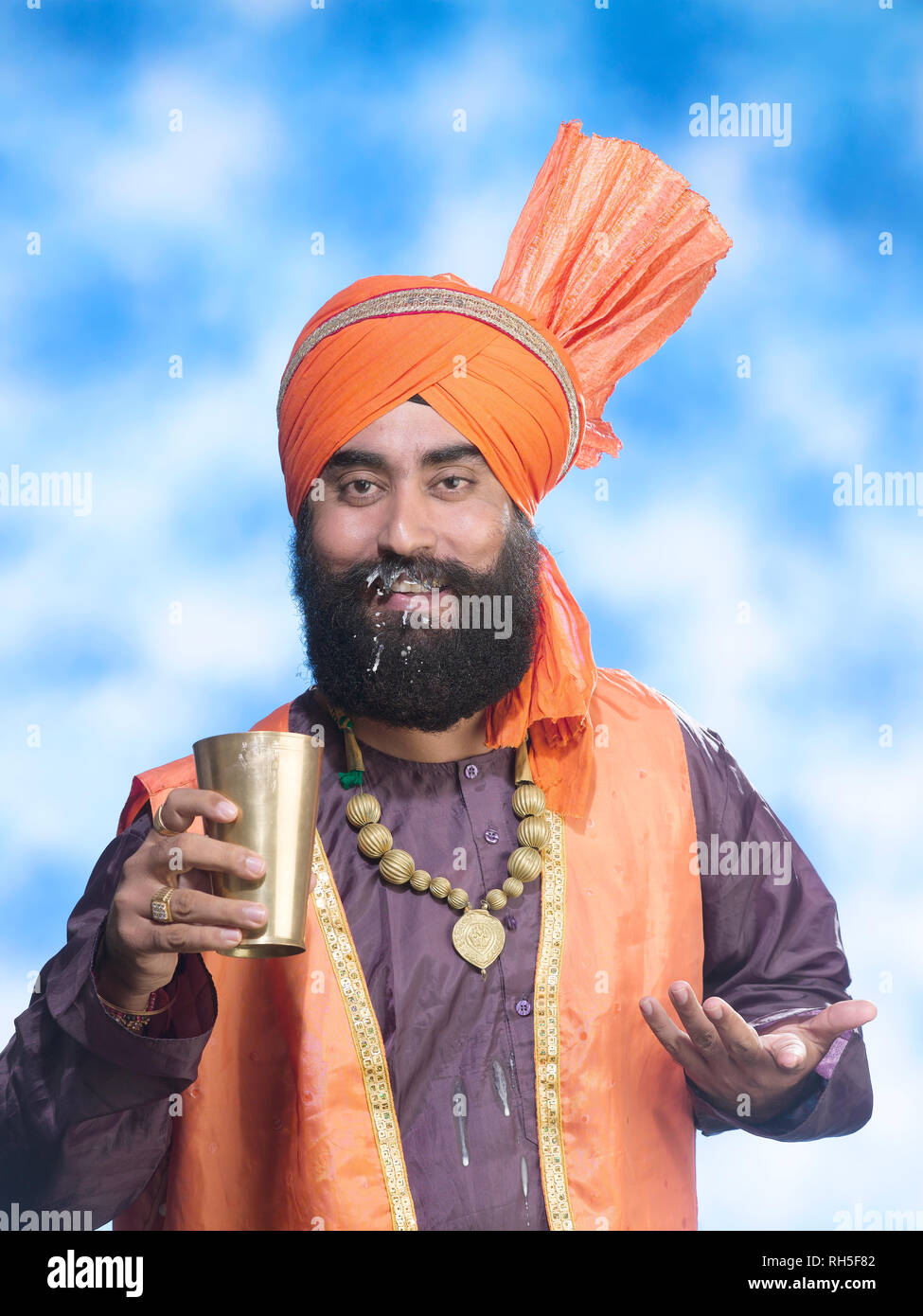 PORTRAIT OF A SIKH SARDAR MAN DRINKING LASSI Stock Photo - Alamy