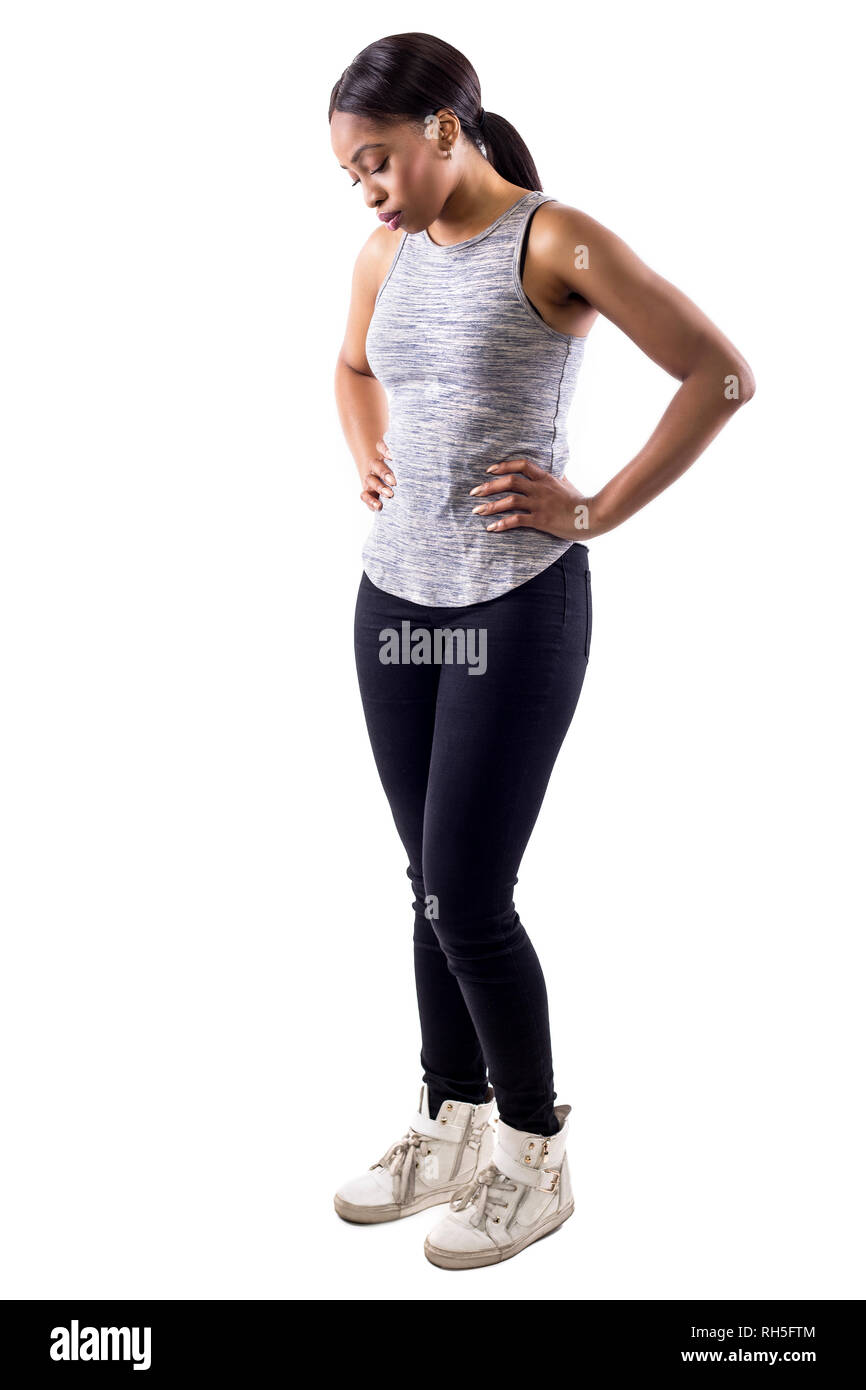 Black female wearing athletic outfit on a white background as a fitness ...