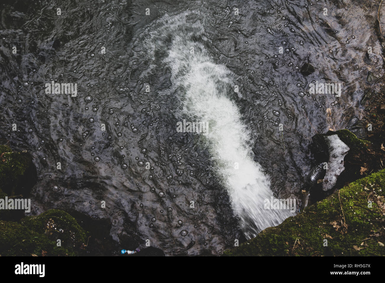 Waterfall and bottle Stock Photo - Alamy