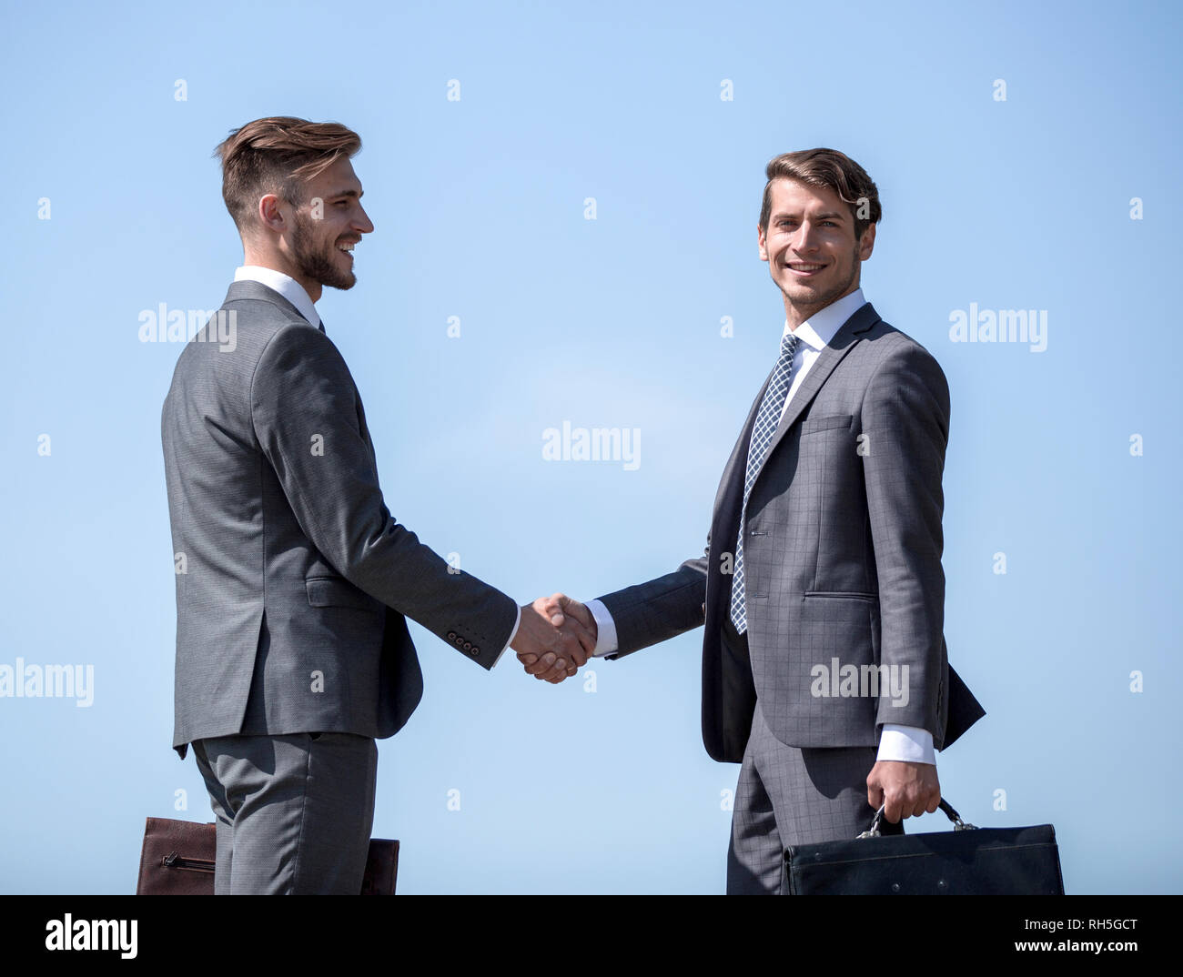 business partners shaking hands Stock Photo - Alamy