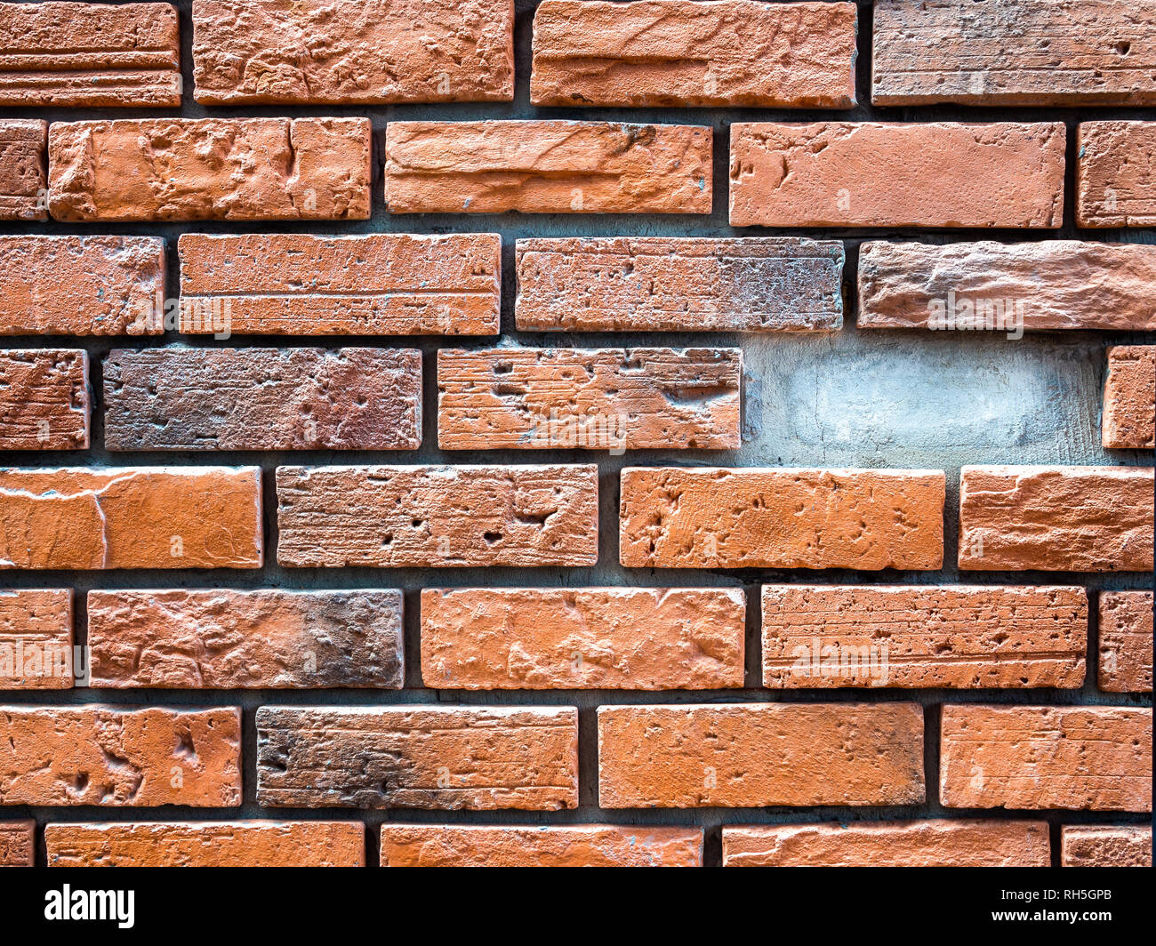 Brick wall background with missing brick. Empty space from missing ...