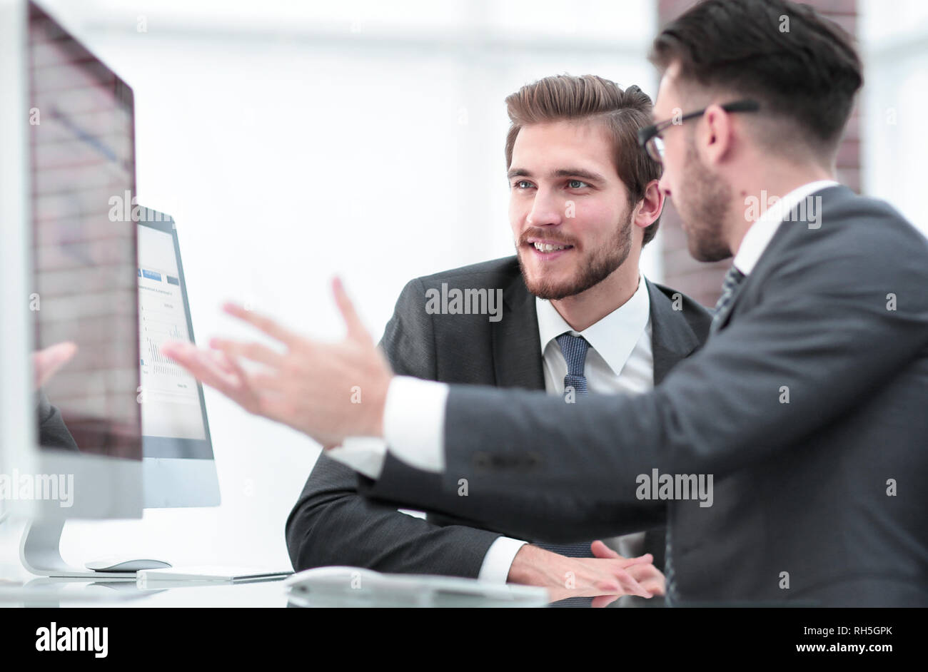 two leaders having a business discussion in the office Stock Photo - Alamy