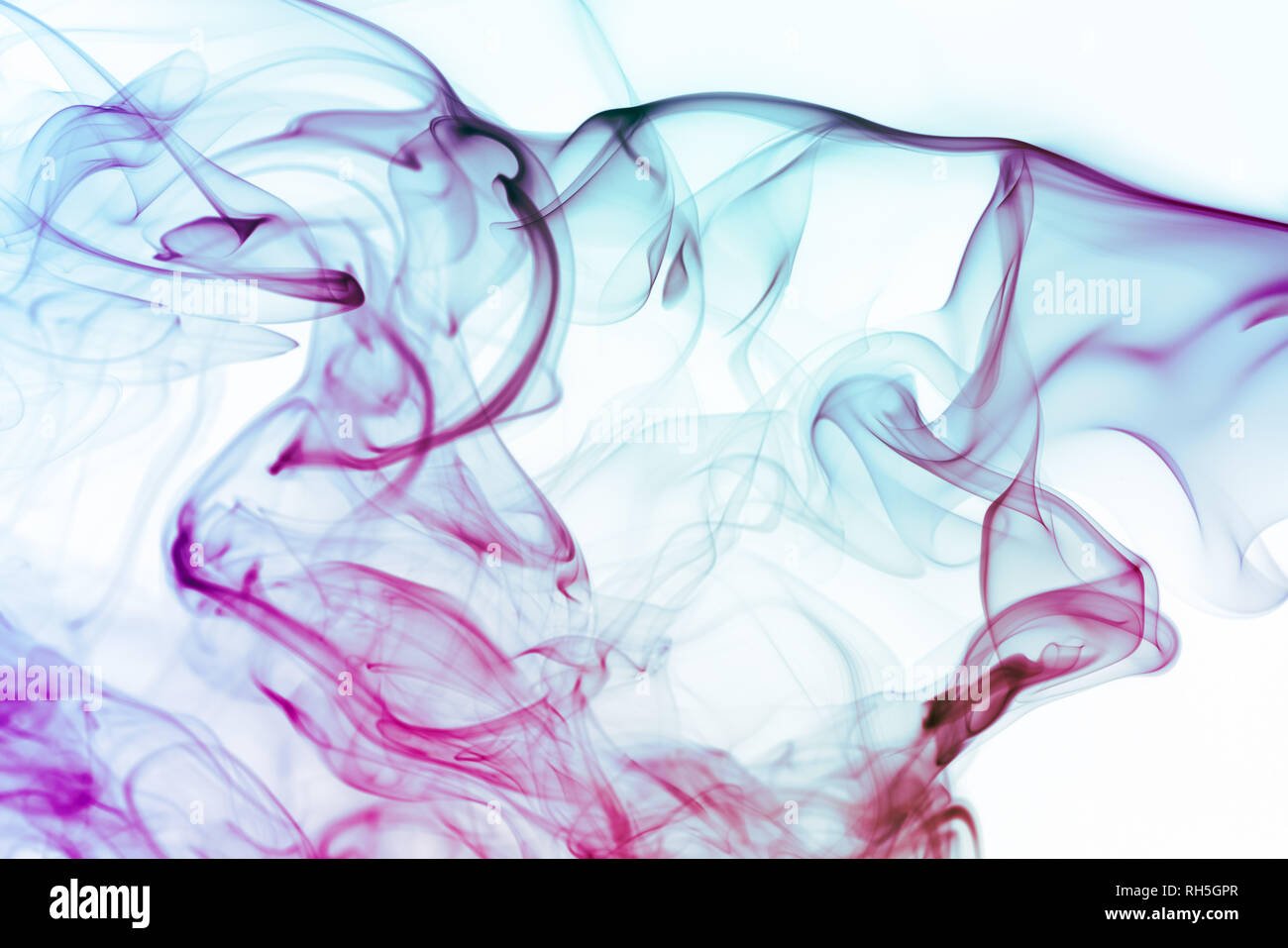 Abstract colored wave smoke on white background Stock Photo - Alamy
