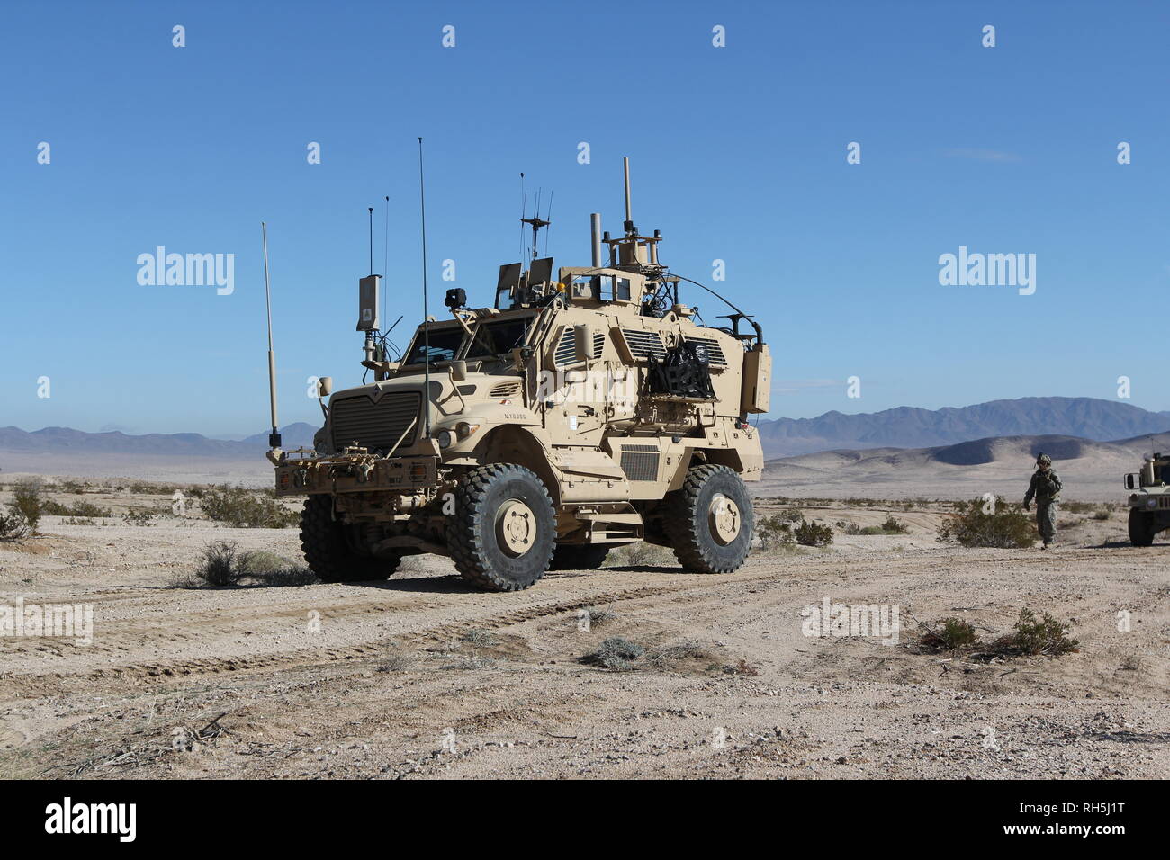 FORT IRWIN, Calif. – An Electronic Warfare Tactical Vehicle supports a ...