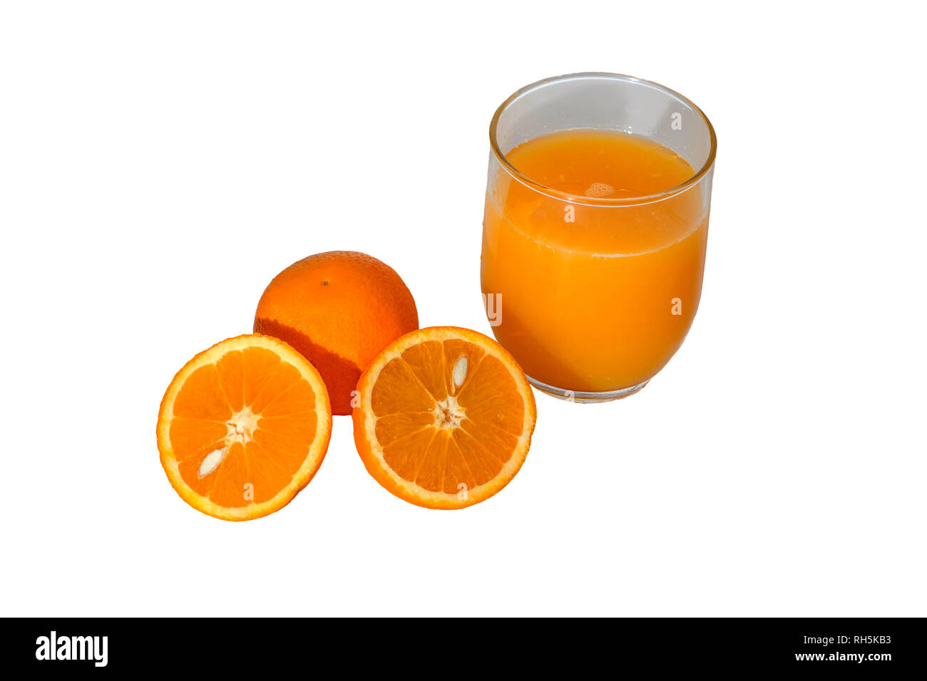 orange split in half with a glass of orange juice Stock Photo - Alamy