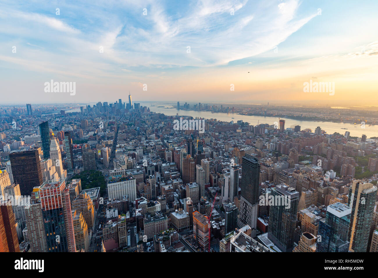 A view of Manhattan during the sunset - New York Stock Photo - Alamy