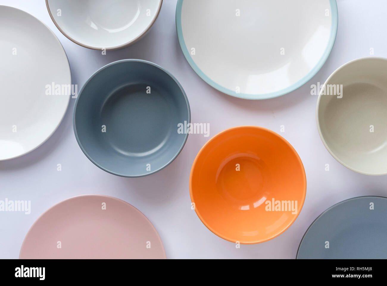 Assorted clean empty bowls and plates for food viewed from above as a ...