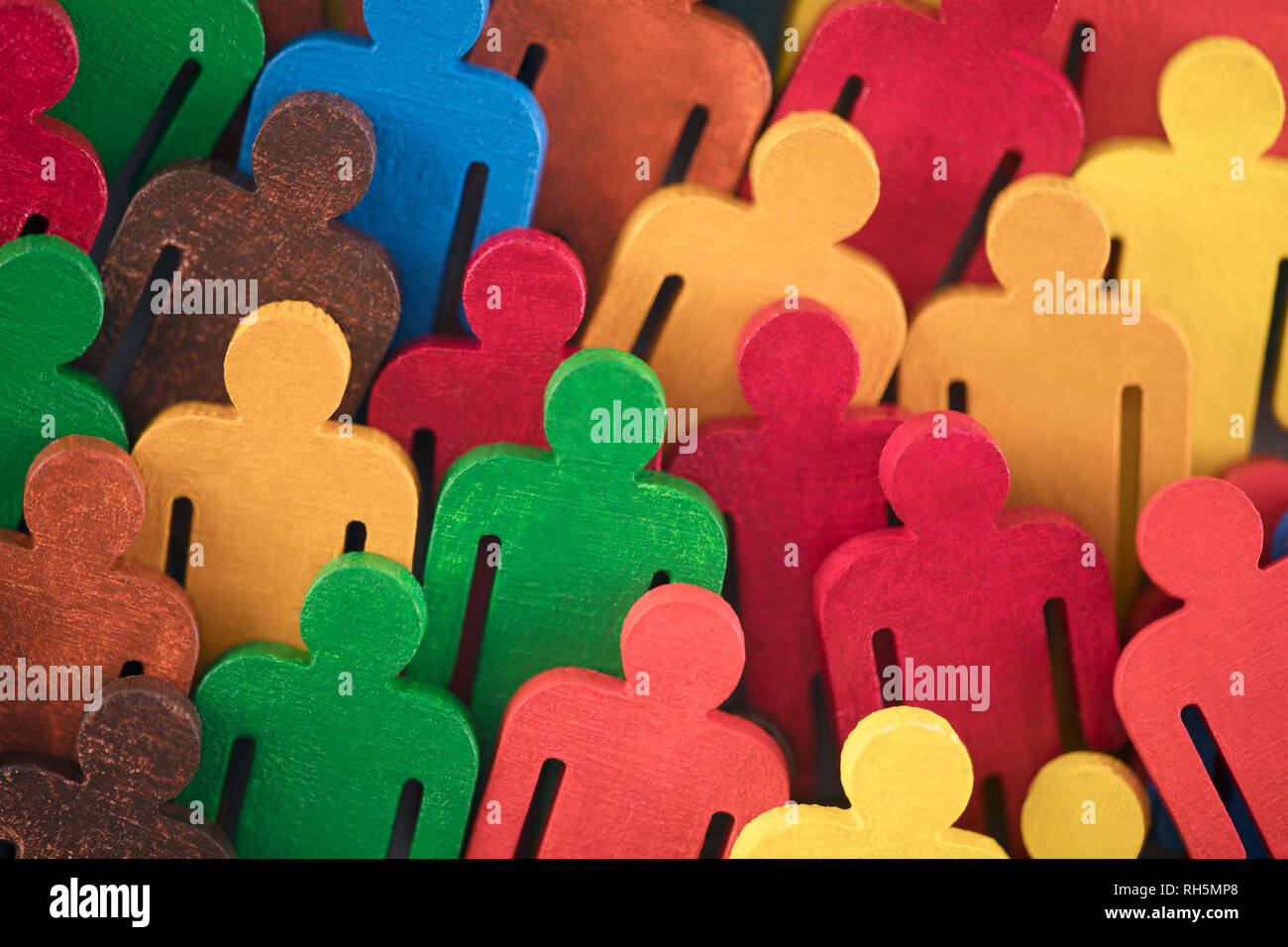 Colorful painted group of people figures Stock Photo - Alamy