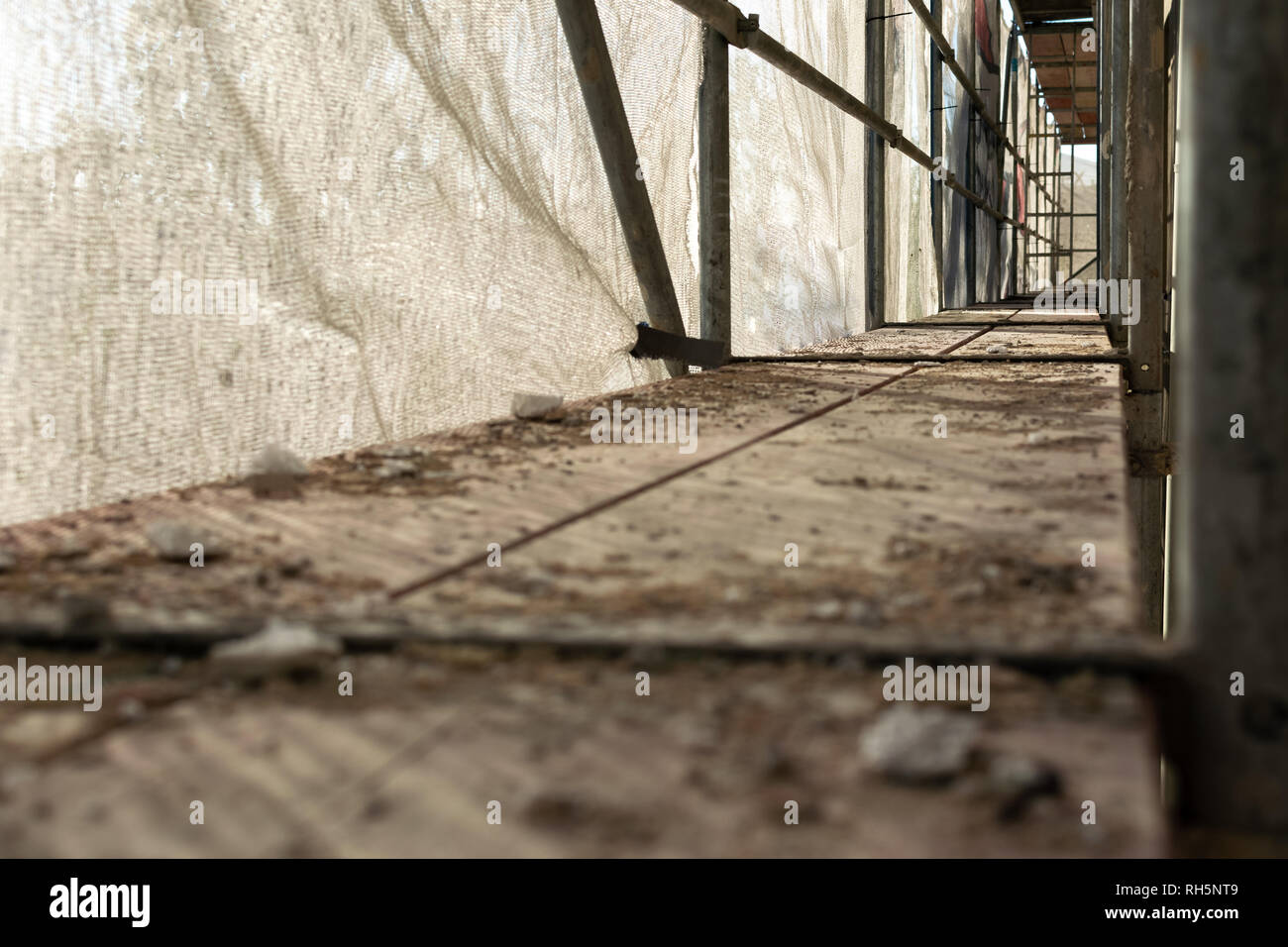 Metal scaffolding set up next to the building during facade renovation ...