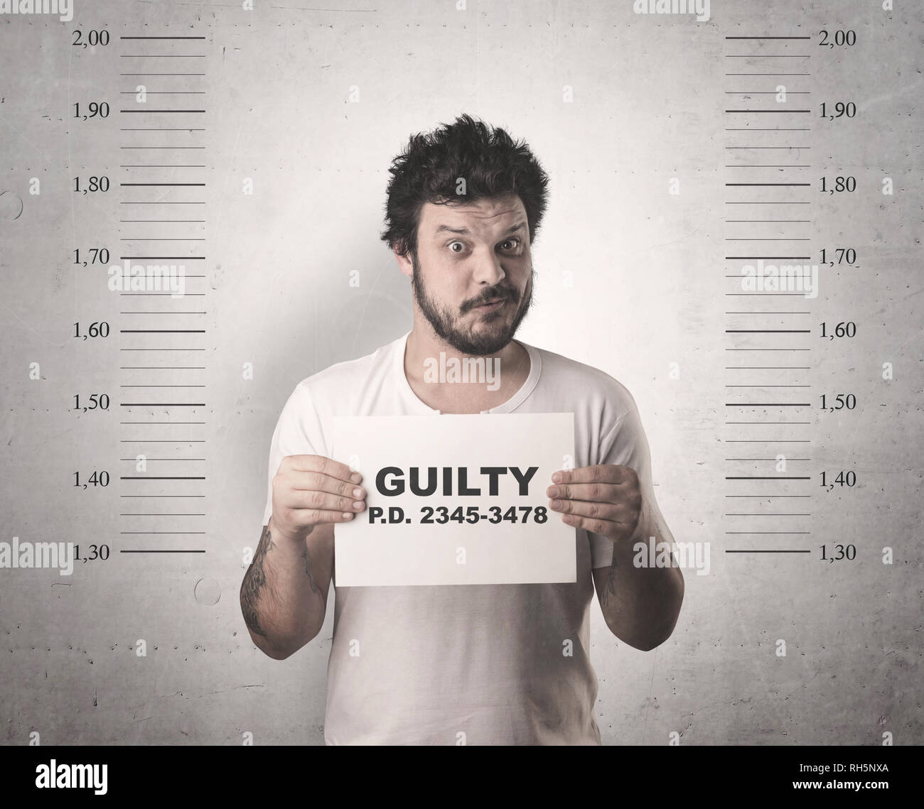 Caught guilty man with ID signs on his hand Stock Photo - Alamy