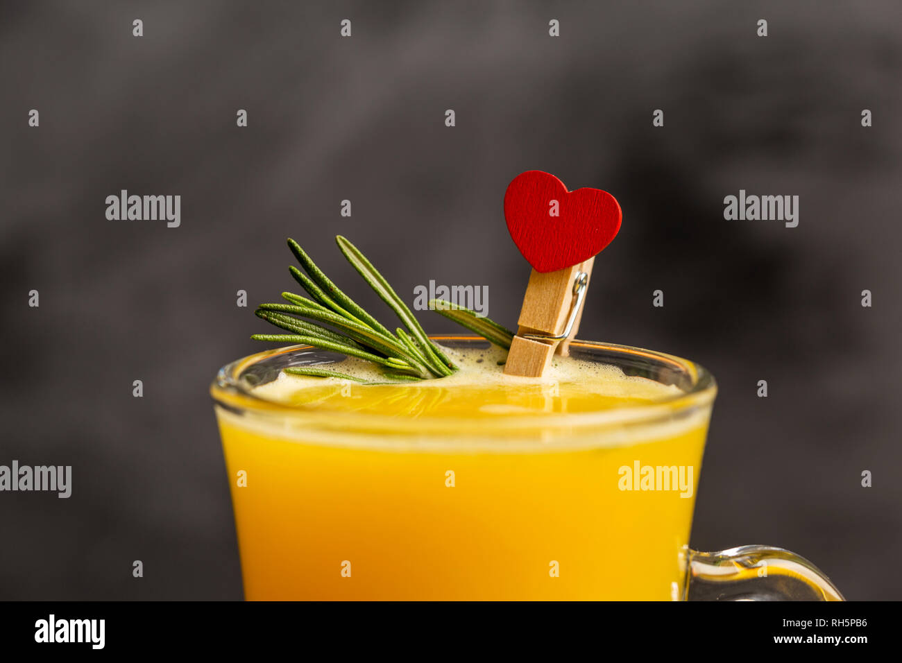 Heart orange juice liquid hi-res stock photography and images - Alamy