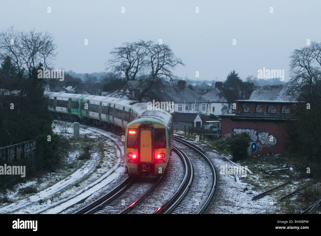 Commuter train in heavy snow hi-res stock photography and images - Alamy