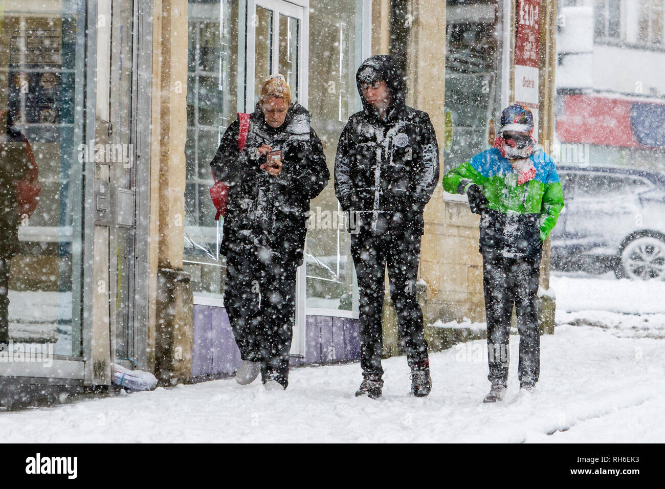 Chippenham, Wiltshire, UK. 1st February, 2019. Pedestrians are pictured ...